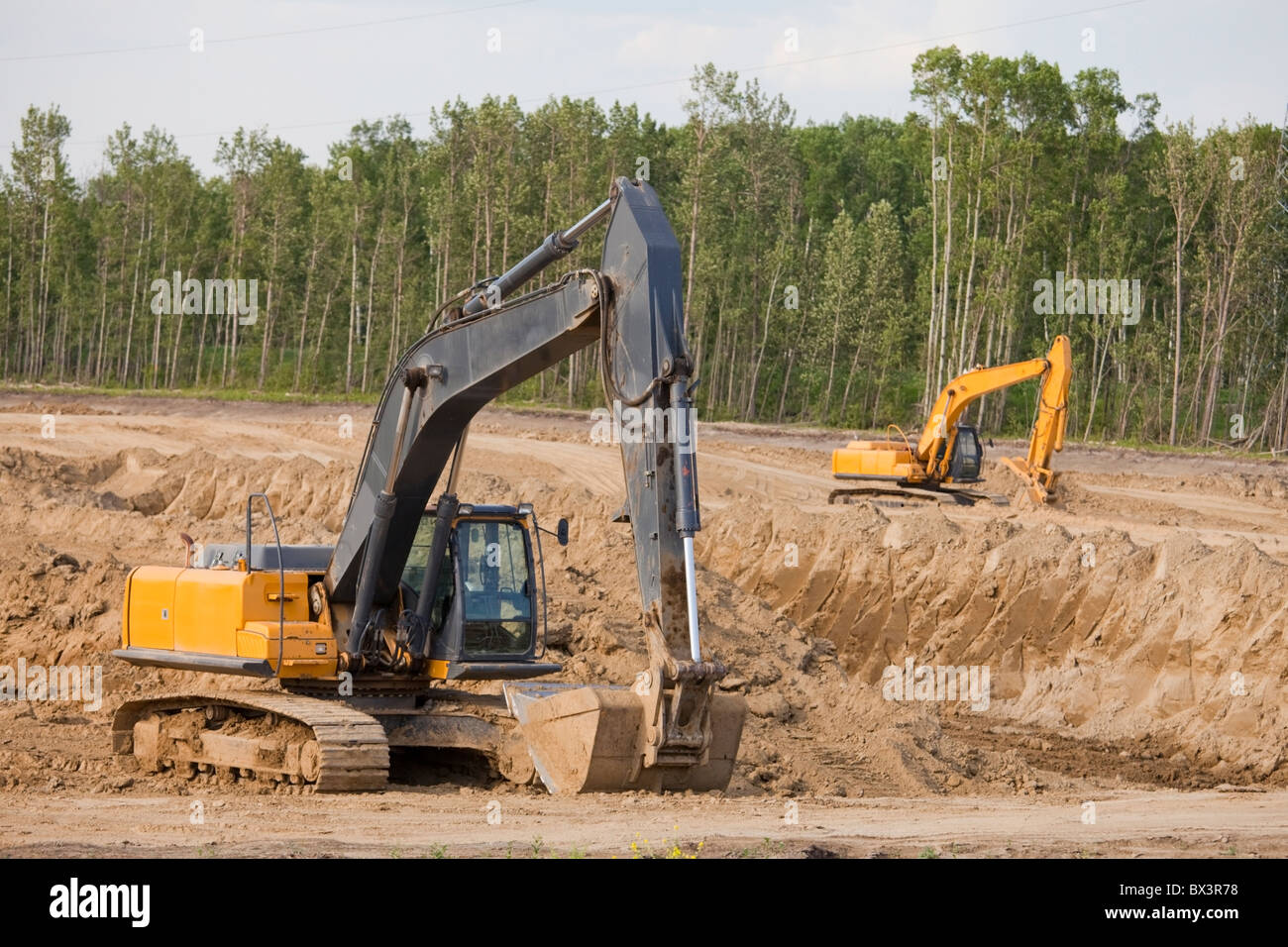 Road Construction Using A Backhoe; Edmonton, Alberta, Canada Stock ...