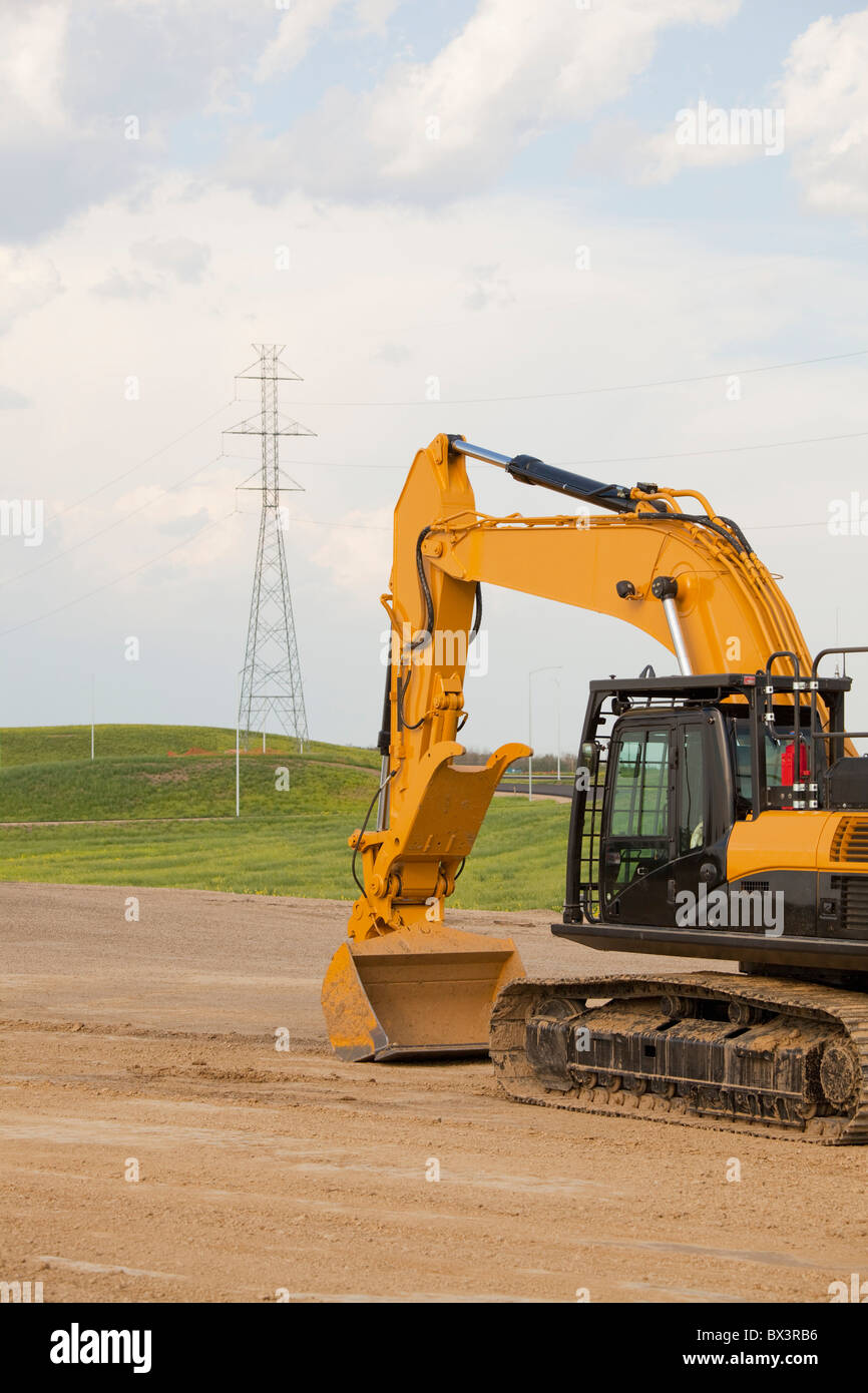 Road Construction Using A Backhoe; Edmonton, Alberta, Canada Stock ...