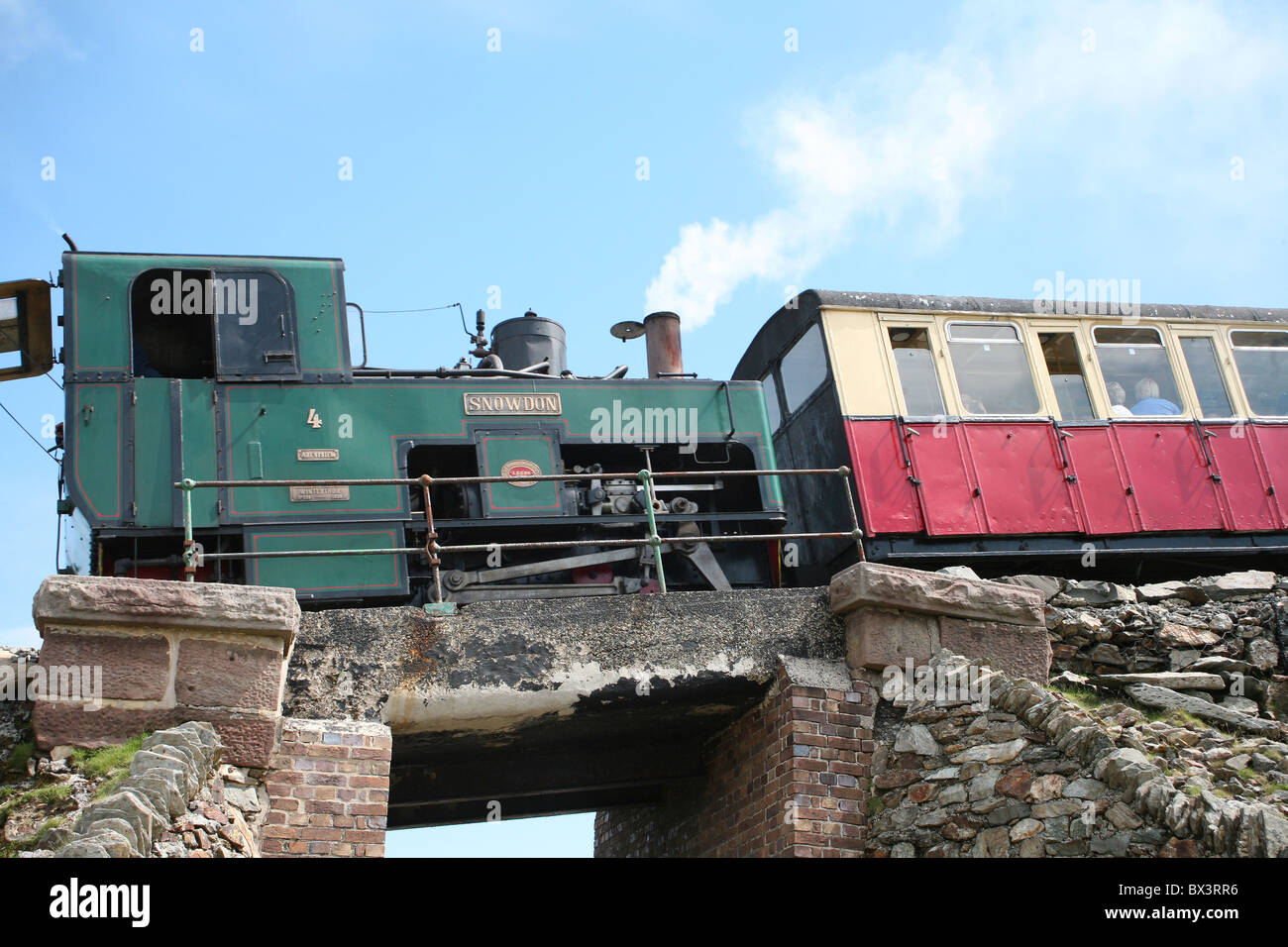 Snowdon steam Train crossing bridge Stock Photo - Alamy