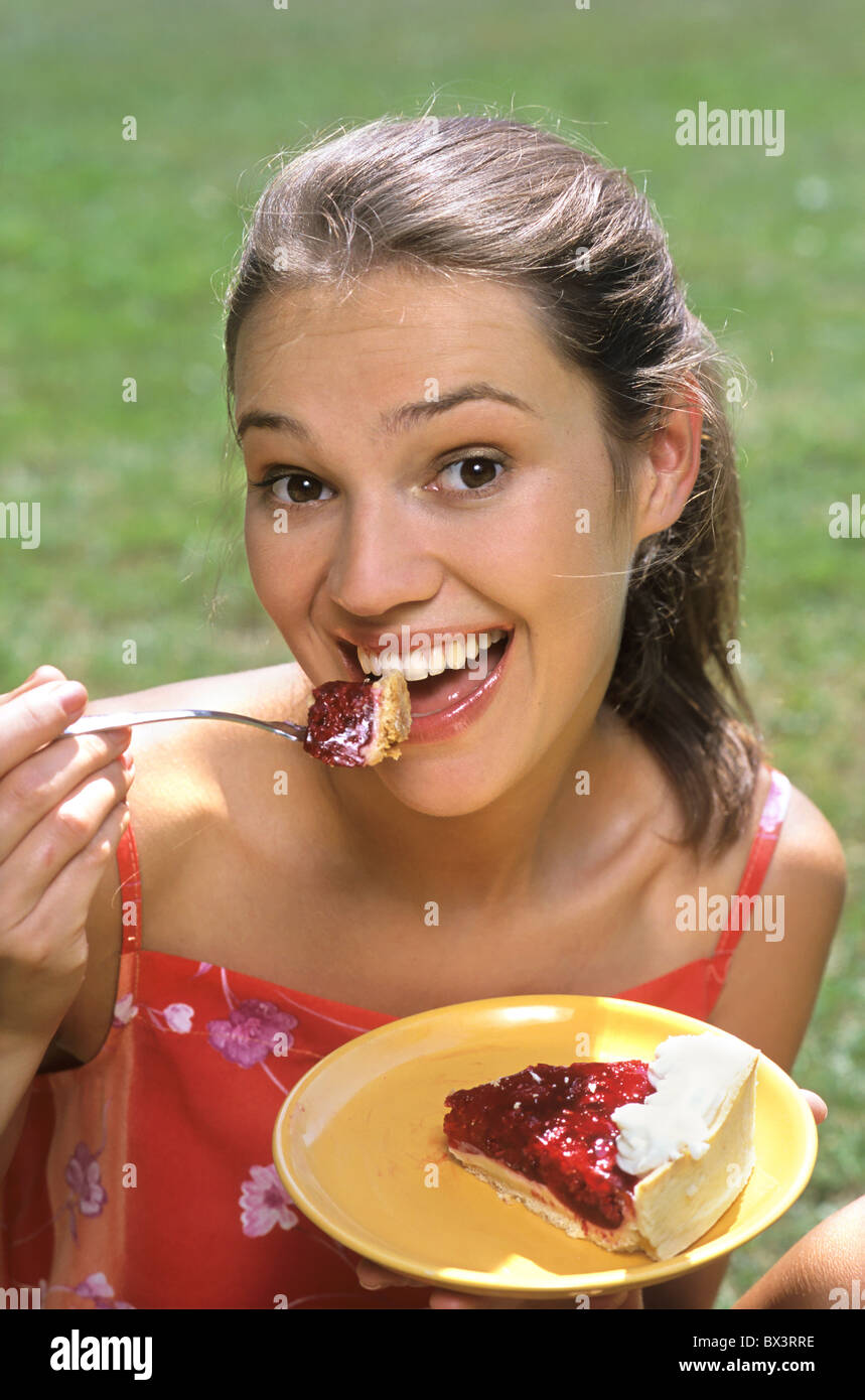 Smiling teen girl eat hi-res stock photography and images - Alamy