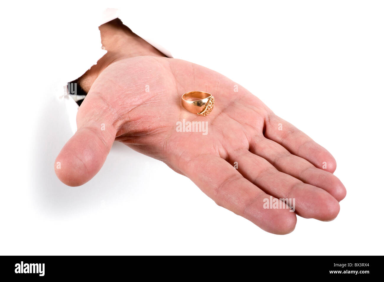 object on white - gold ring on the hand Stock Photo - Alamy