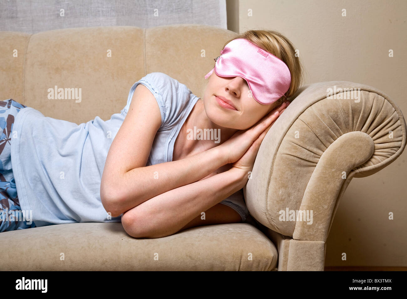 Young woman sleeping at home Stock Photo - Alamy