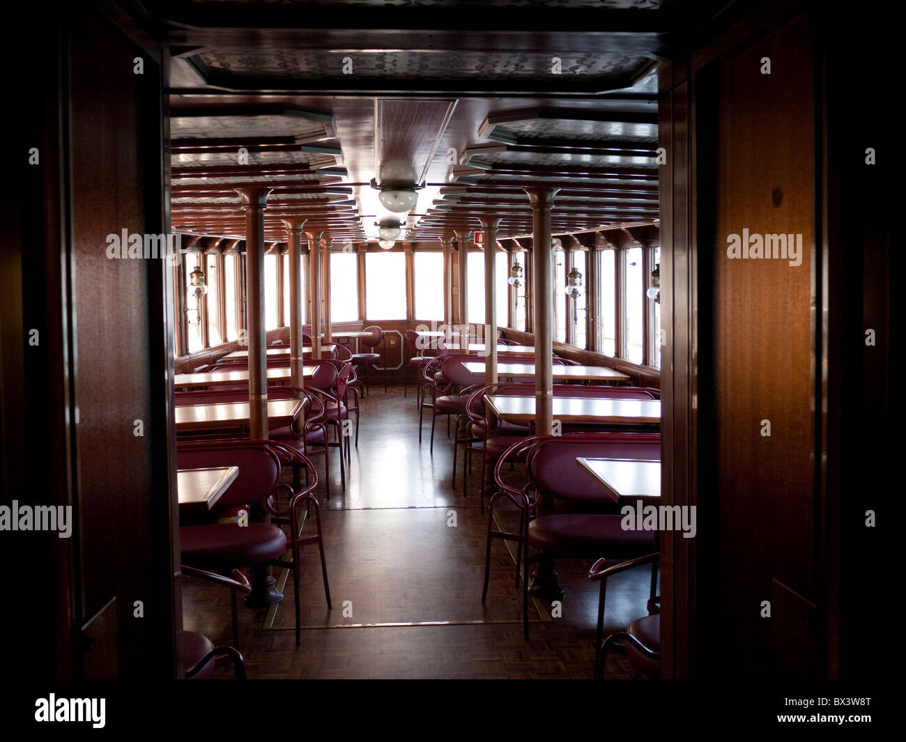 The wooden interior of the Paddle Steamer ferry on Lake Garda in the ...