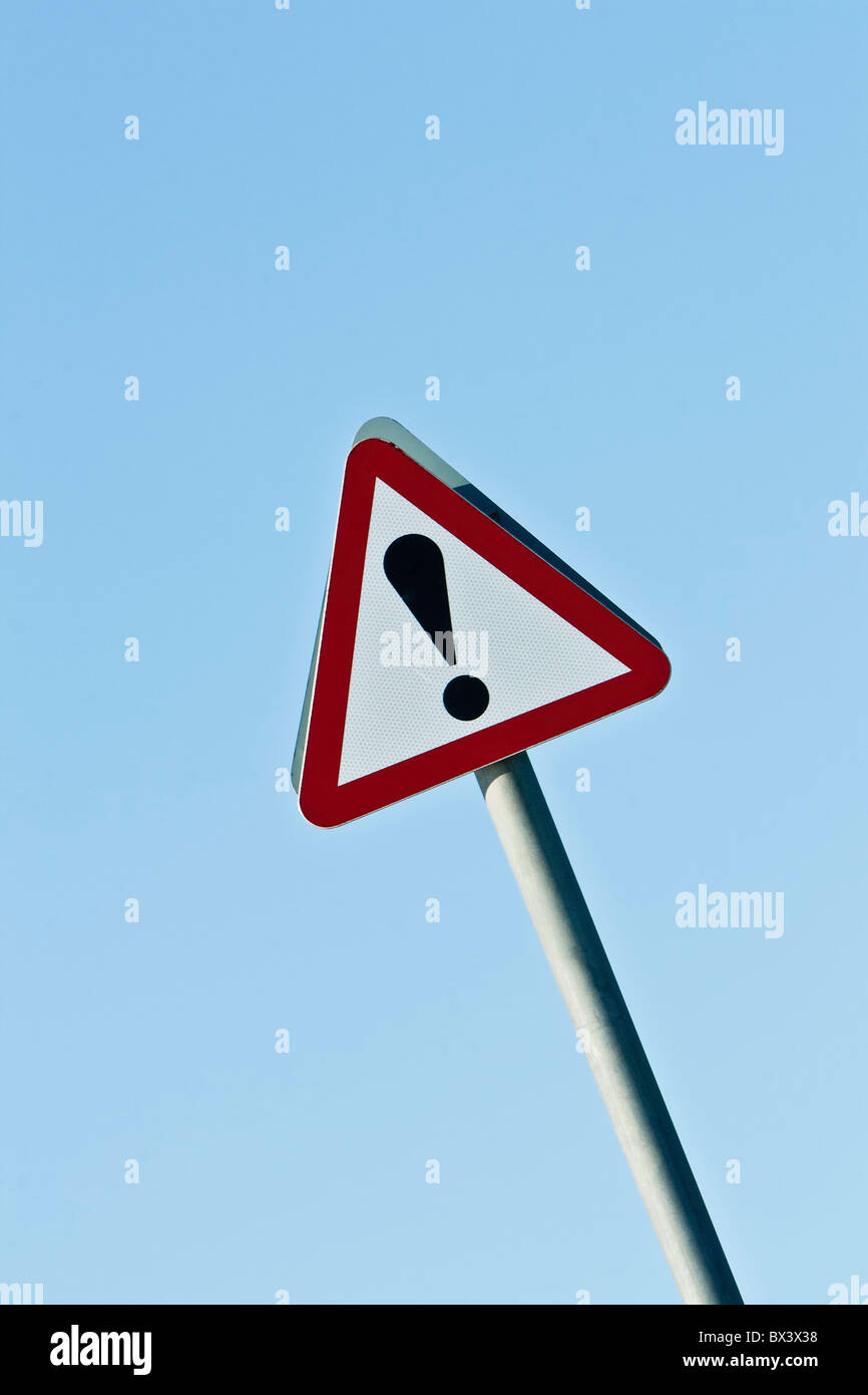 Hazard Road Sign against a blue sky Stock Photo - Alamy