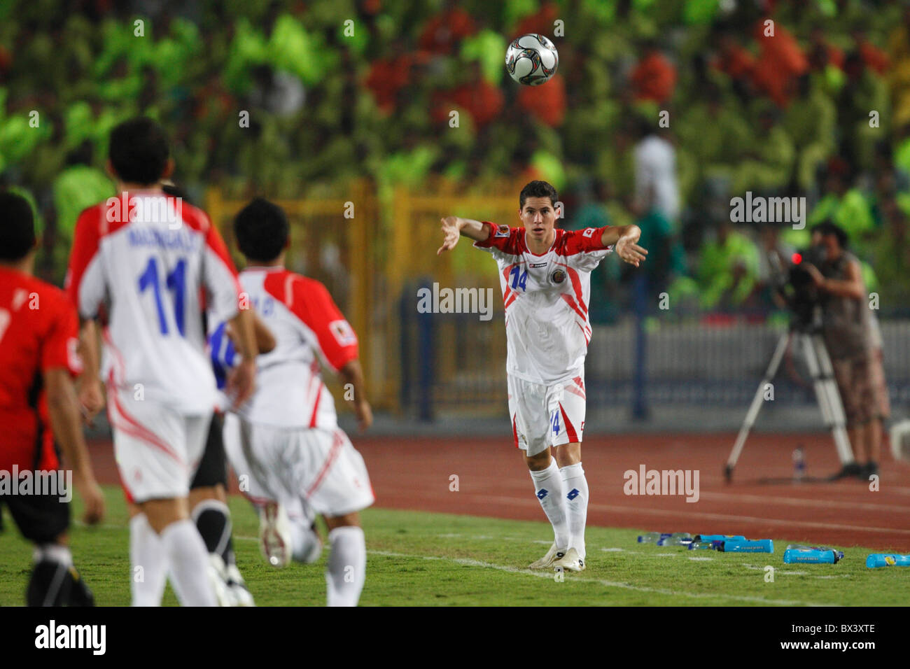 CAIRO - OCTOBER 6: Bryan Oviedo of Costa Rica takes a throw in during a ...