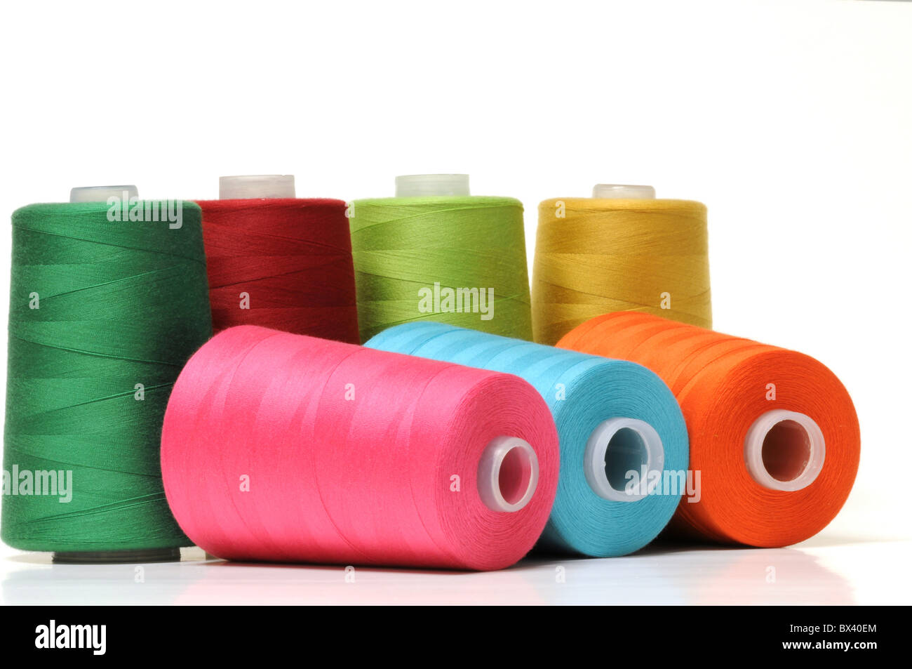 Group of multicolored sewing threads Stock Photo - Alamy