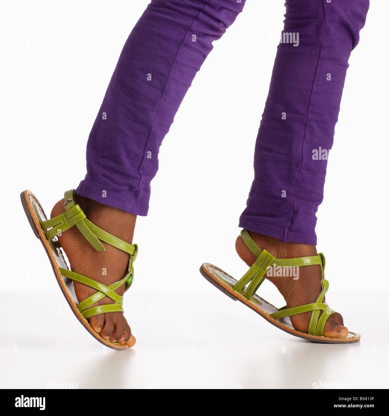 Girls feet wearing sandals hi-res stock photography and images - Alamy