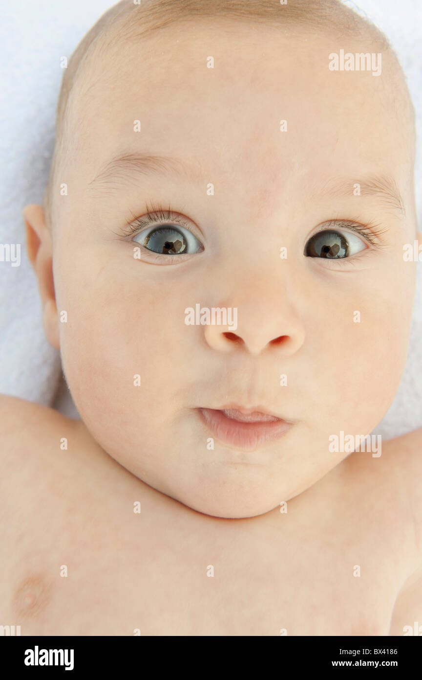 A Baby With A Surprised Look Stock Photo - Alamy