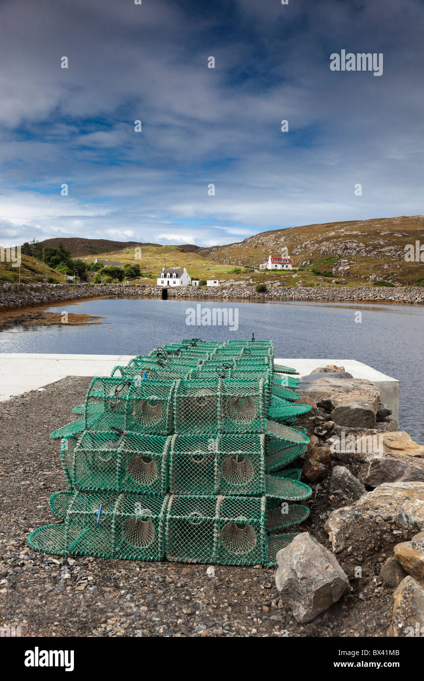 Fishing Traps Sitting On The Shore; Isle Of Barra, Scotland Stock Photo ...