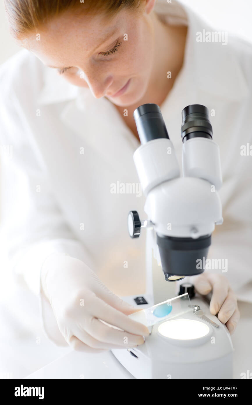 Microscope laboratory - woman medical research chemist experiment ...