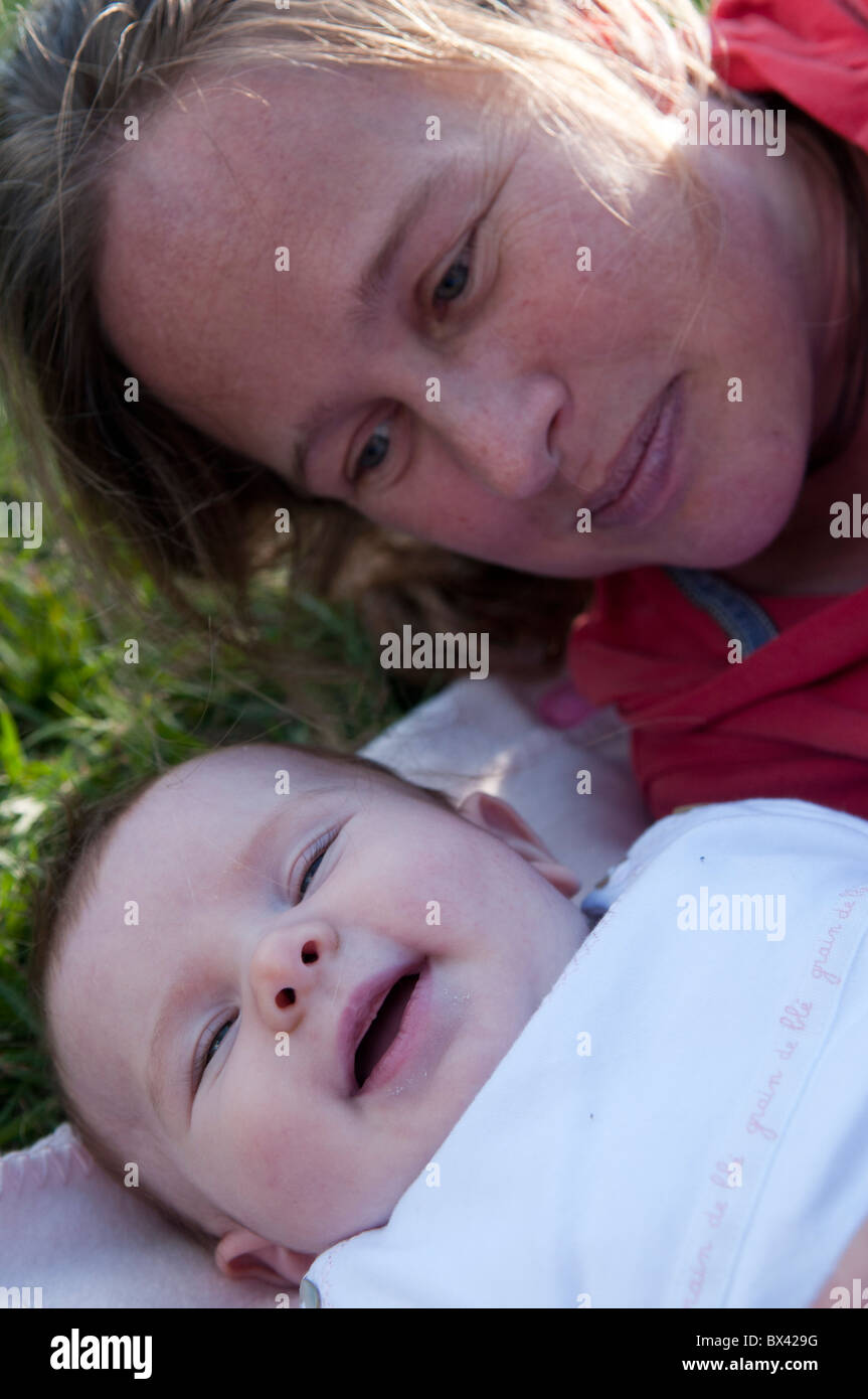 Mother and 2 month old baby girl Stock Photo - Alamy