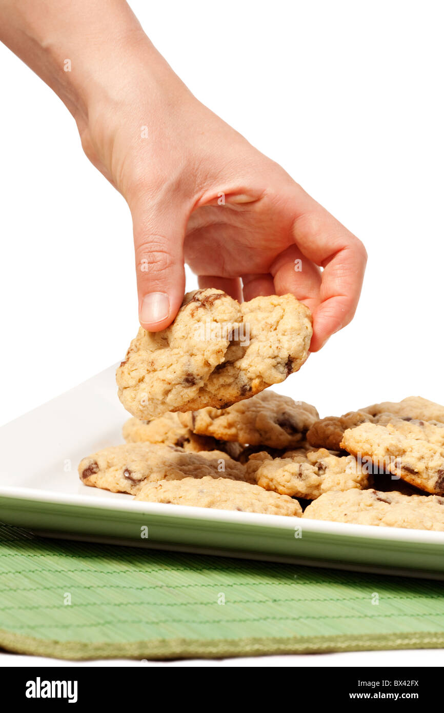 Chocolate chip cookies hand hand hi-res stock photography and images ...