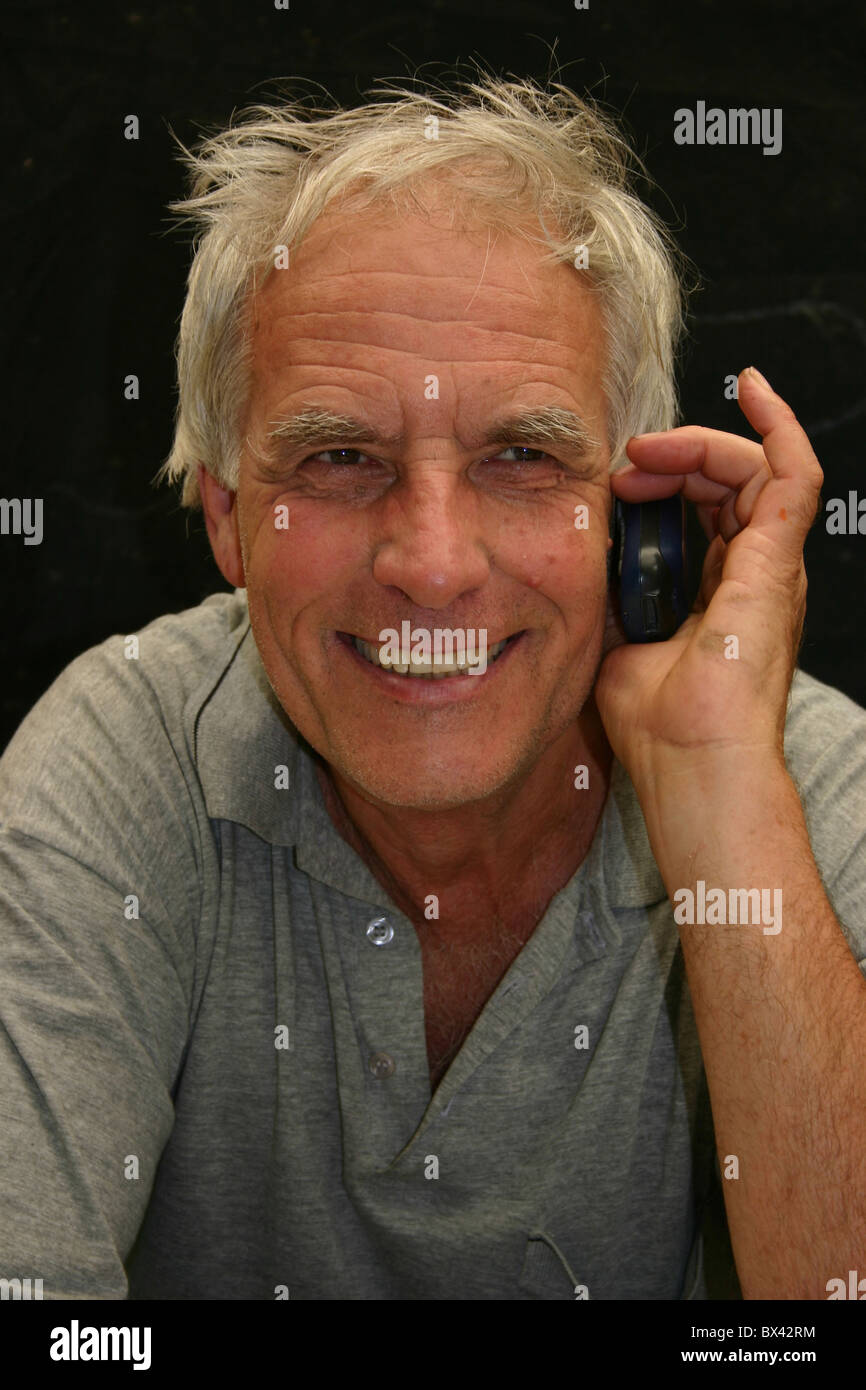 elderly man man portrait mobile mobile phone mobile radio calling up ...