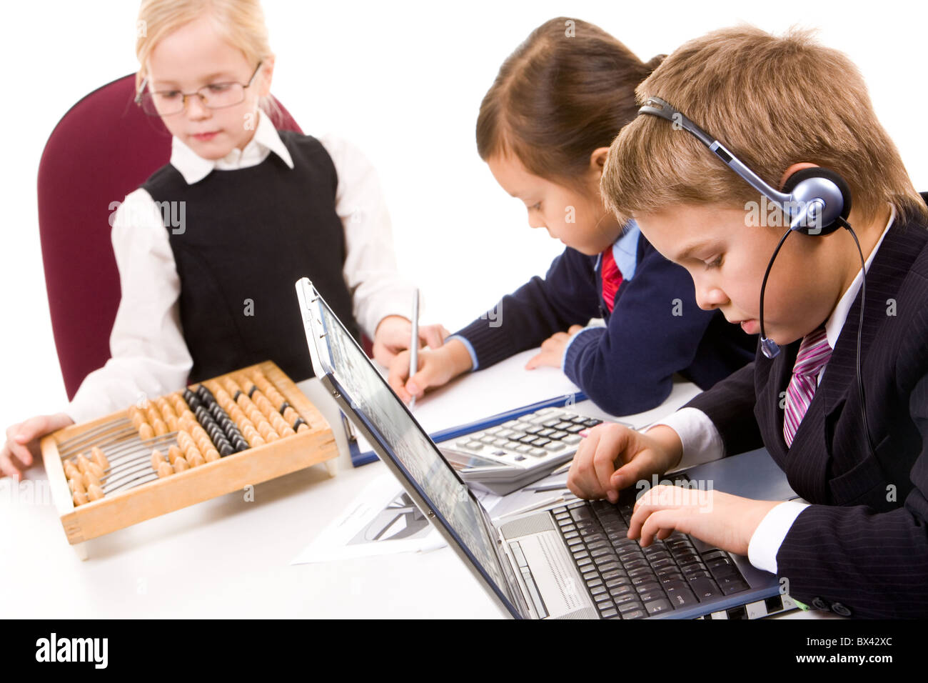 Photo of serious business partners doing their work at meeting Stock ...