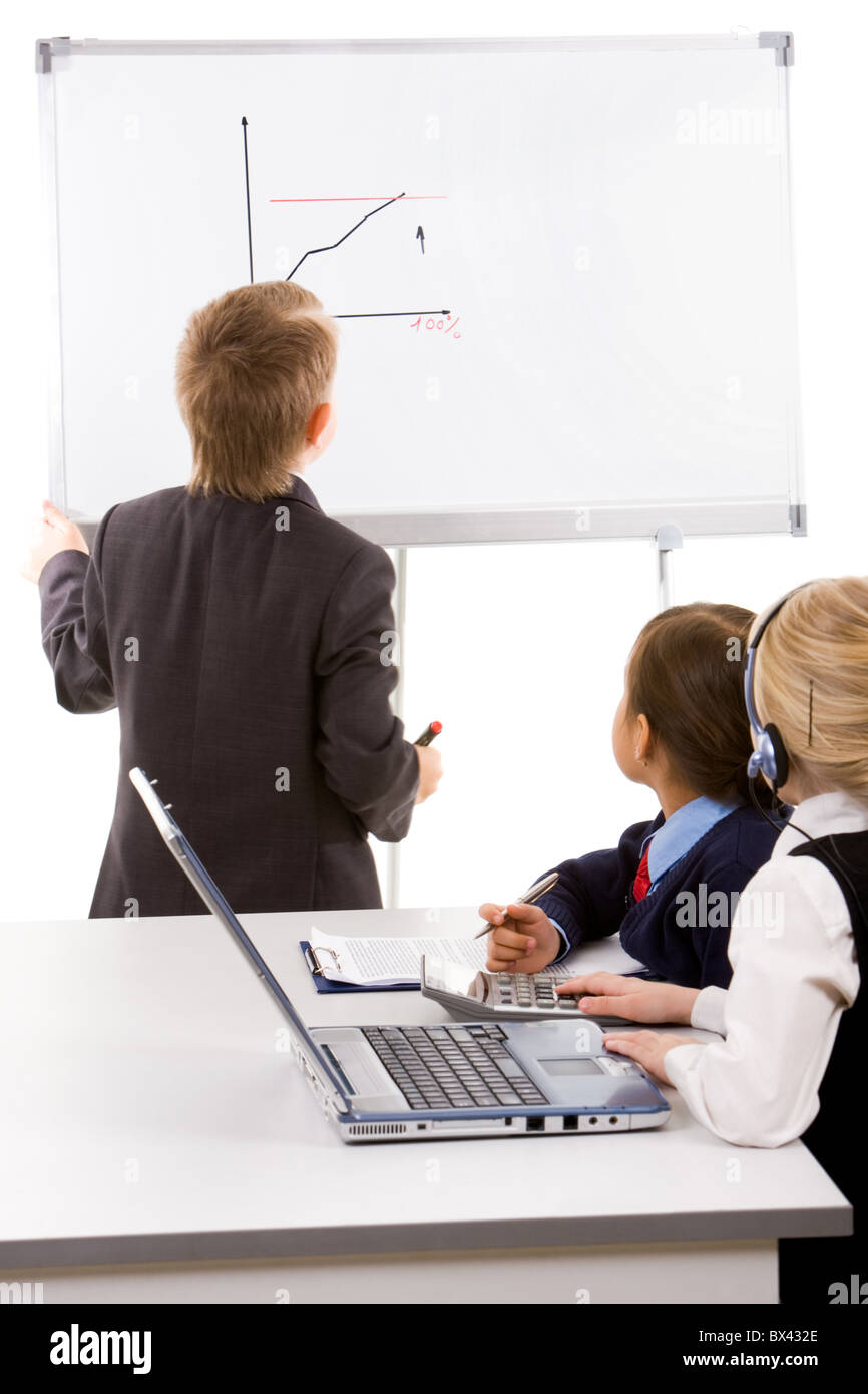 Photo of cute children looking at whiteboard during presentation Stock ...