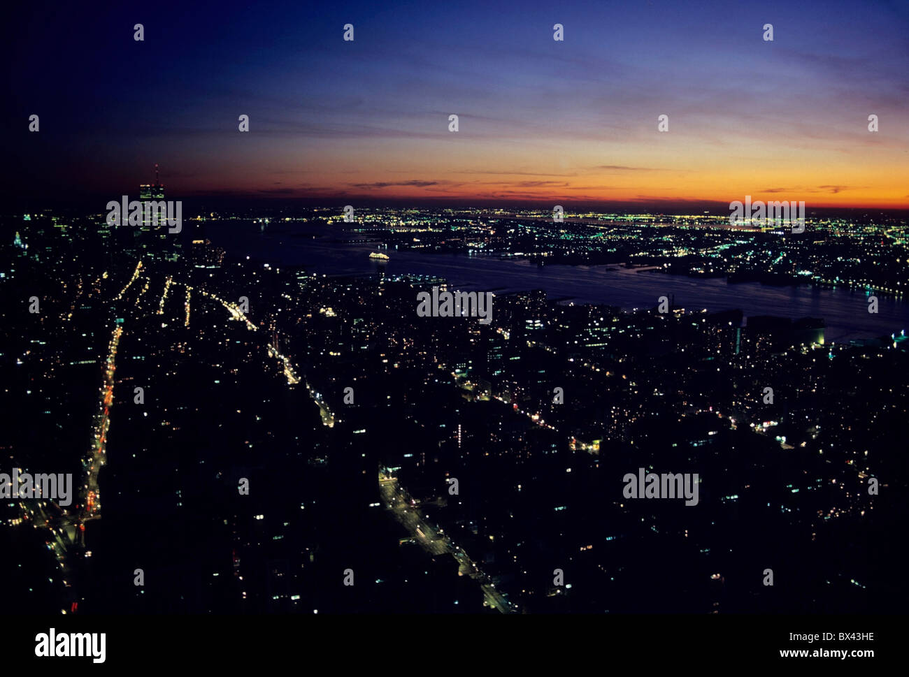 Lit up cityscape of Manhattan, New York, USA Stock Photo - Alamy