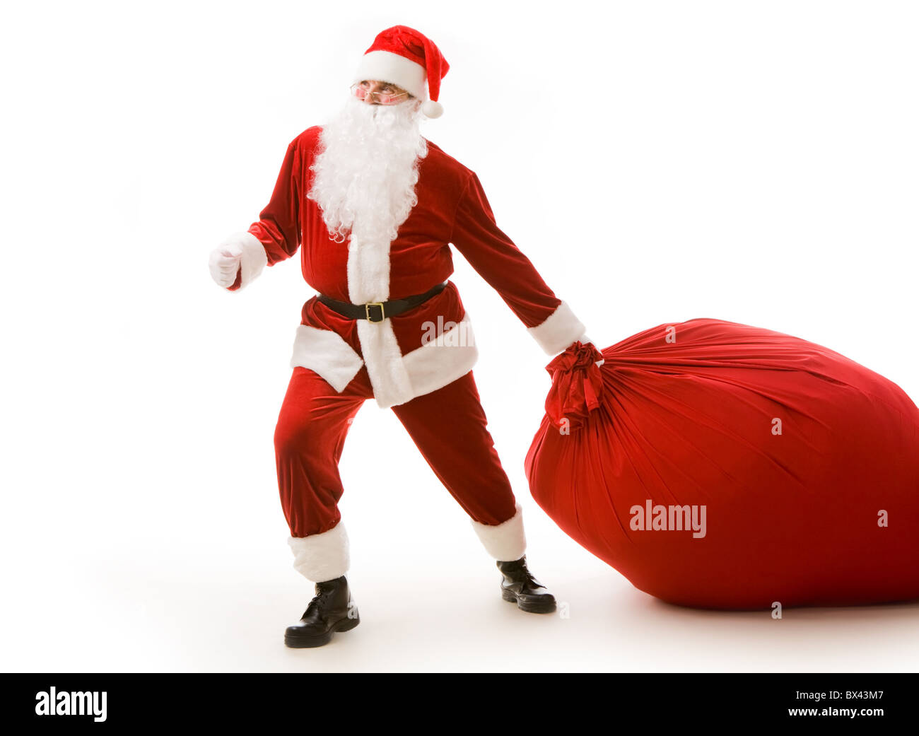 Santa carrying sack hi-res stock photography and images - Alamy
