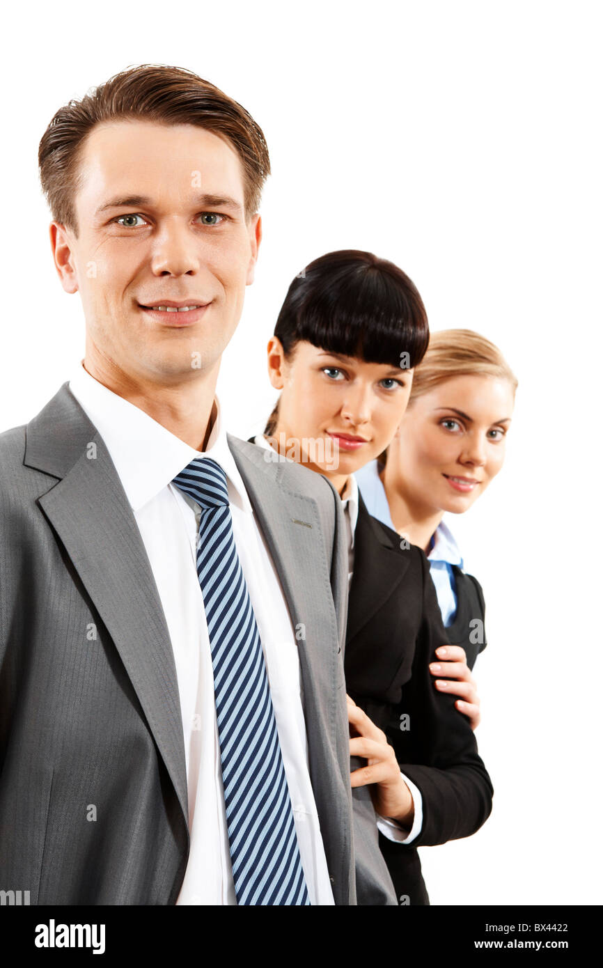 Pretty ladies looking at camera from behind confident man Stock Photo ...