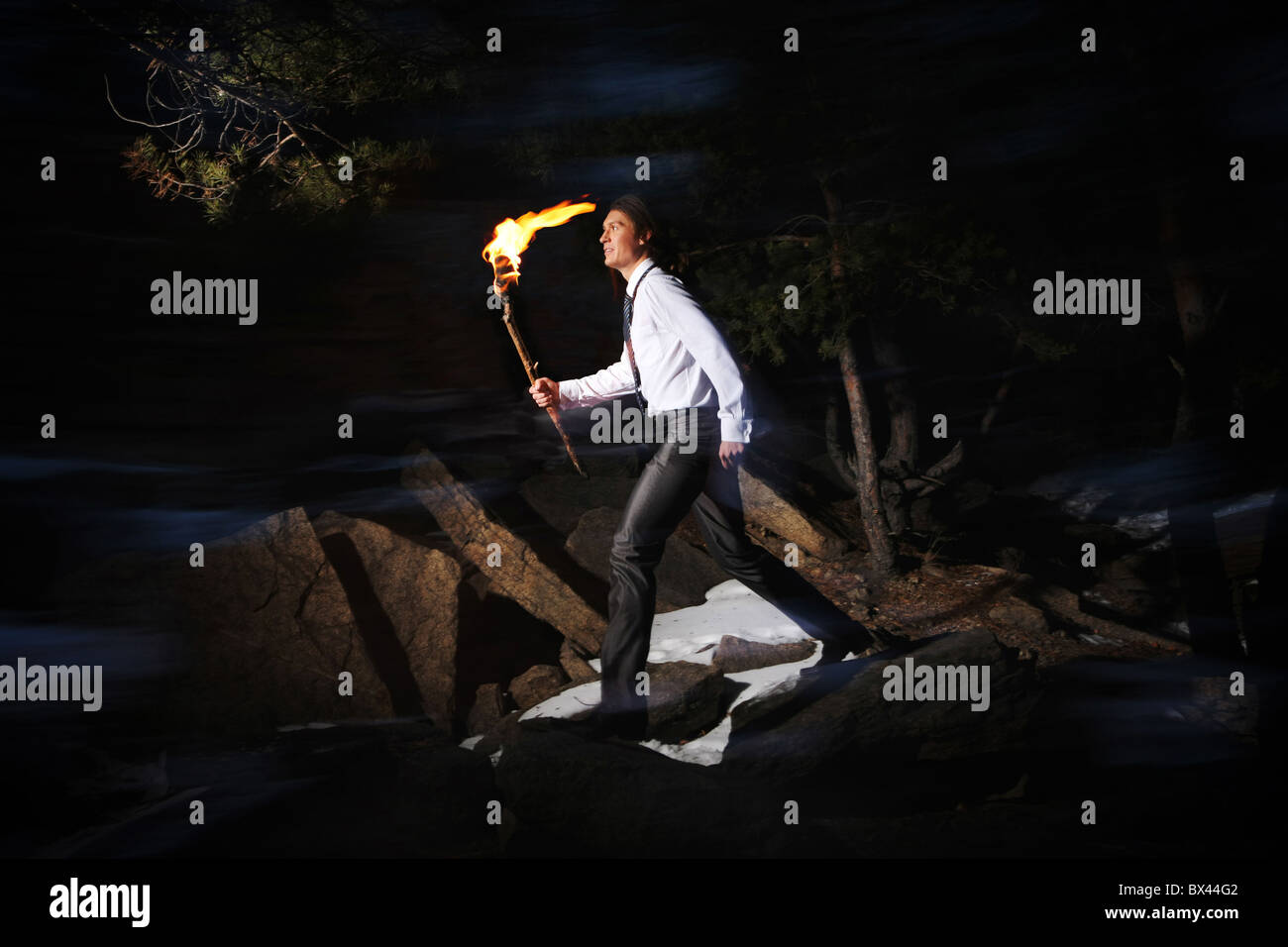 Man With Torch Light Dark High Resolution Stock Photography and Images ...