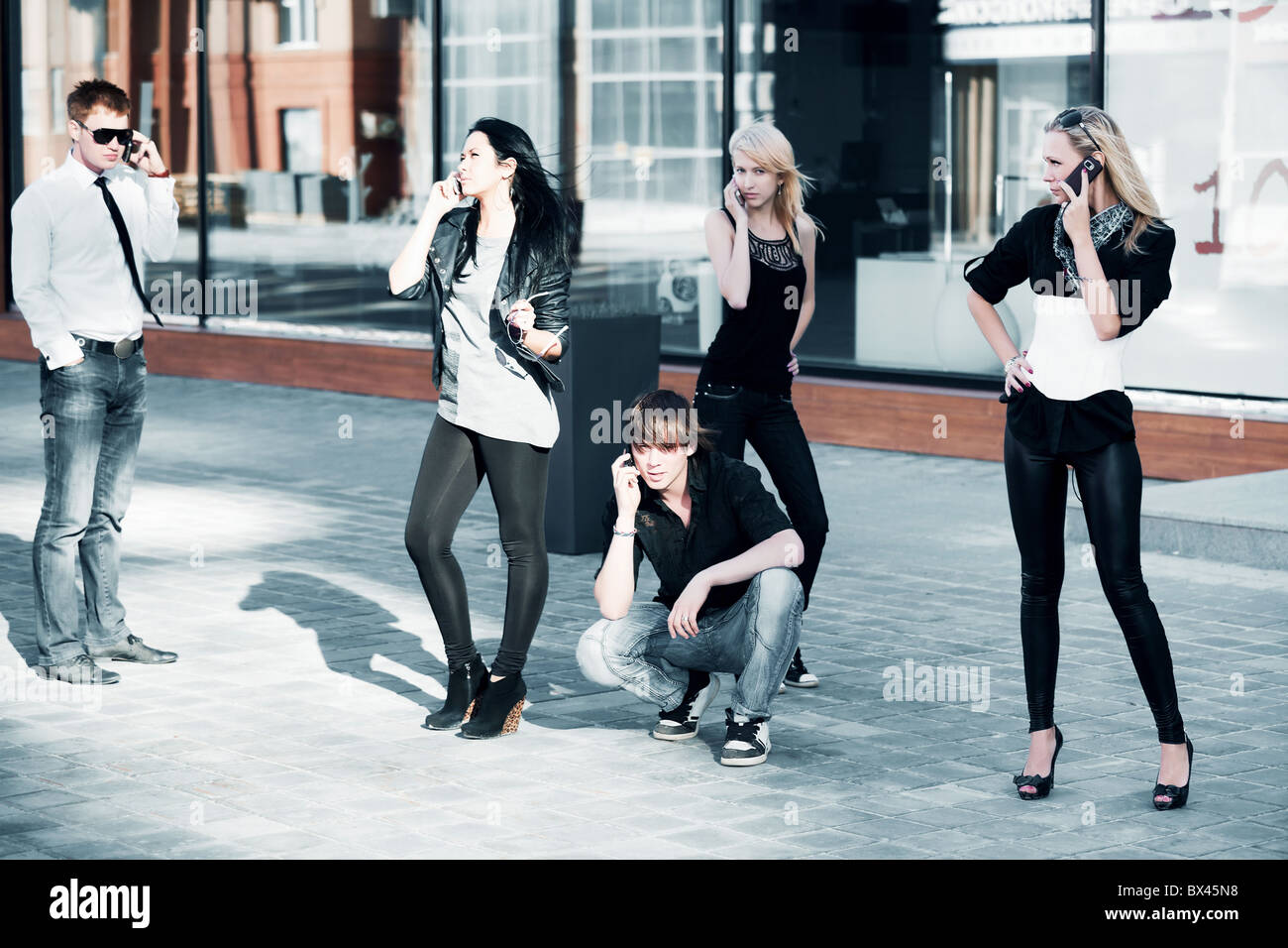 Young people calling on the mobile phones Stock Photo - Alamy