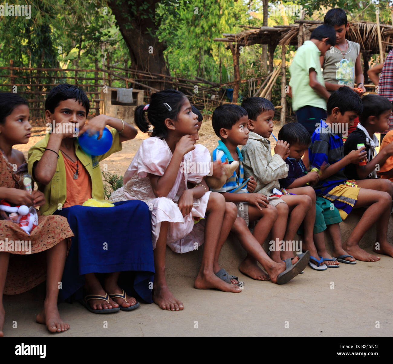 Young school children receiving gifts from tourists in Goa, India Stock ...