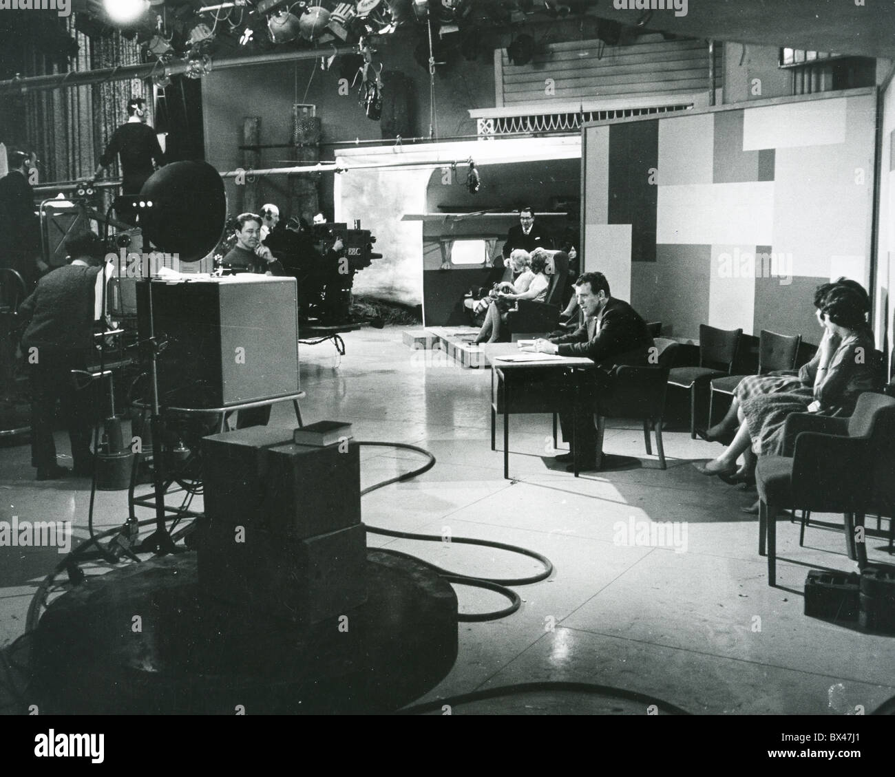 EAMONN ANDREWS (1922-1987) Irish TV presenter on a BBC TV show about ...