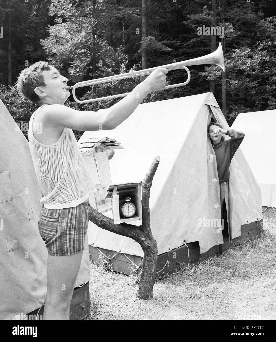 Trumpeter sounds reveille in scouts summer camp, July 1968. CTK Photo ...