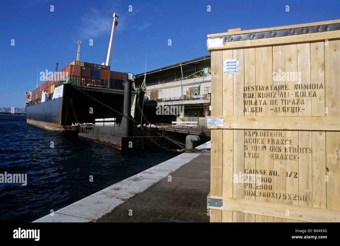 Cargo ship pulling into the quay to be loaded with containers ...