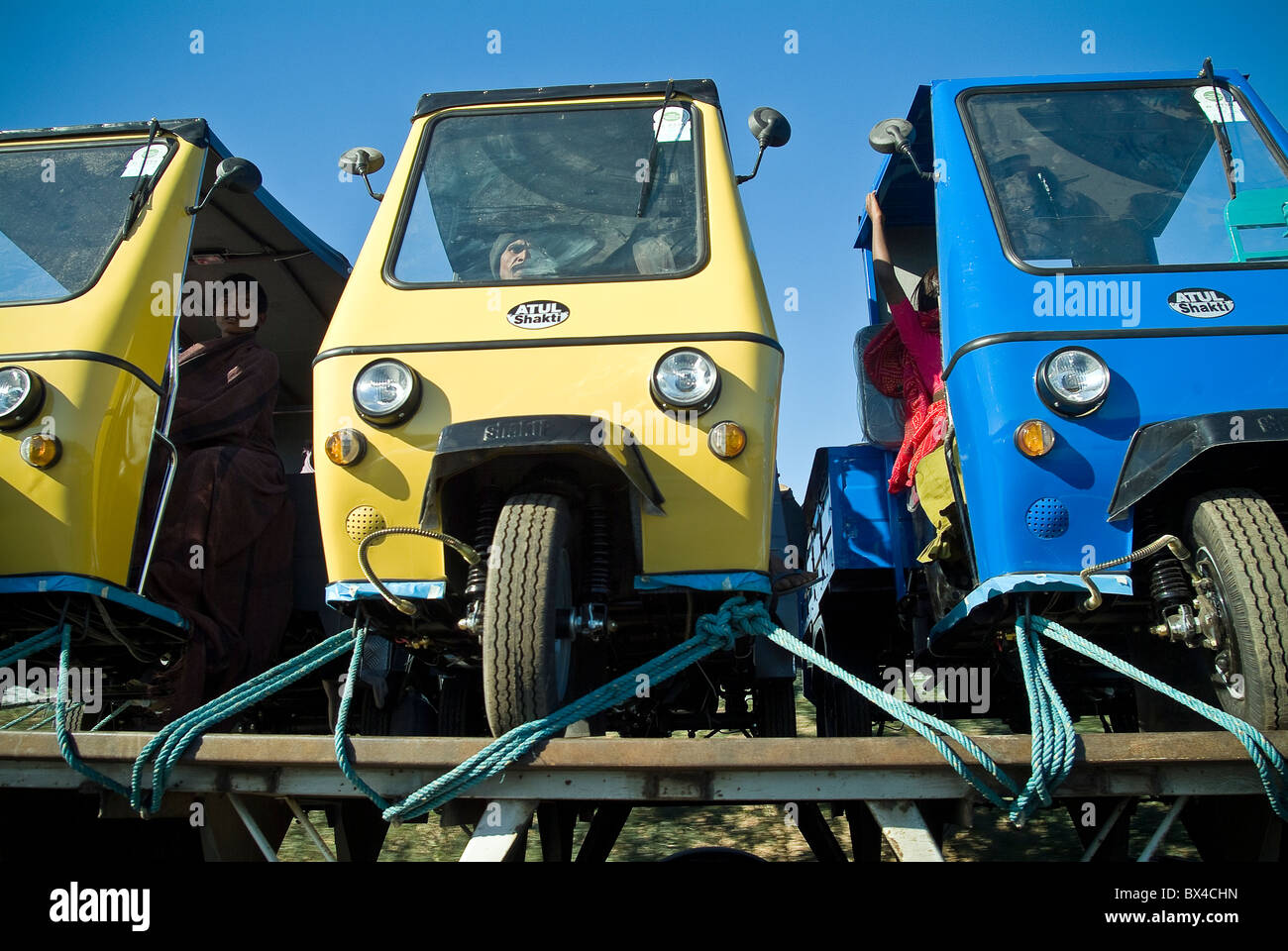 Motor rickshaws being delivered on the back of a lorry in Gujarat ...