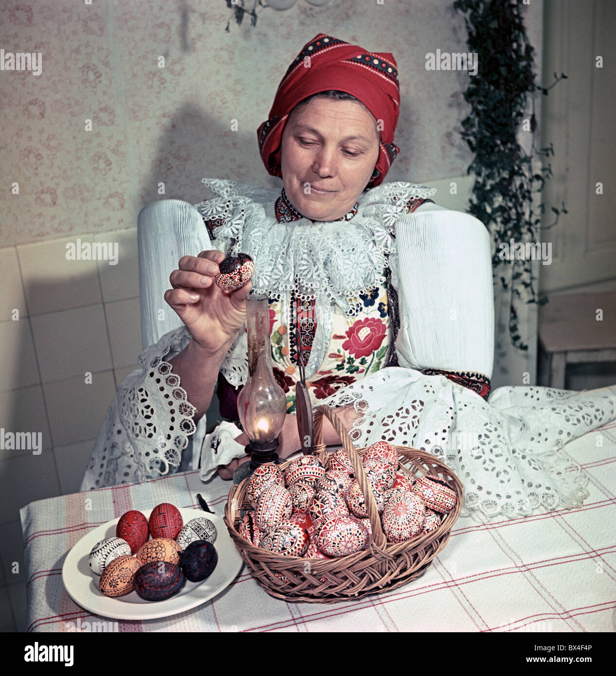 Czechoslovakia, Easter 1958, woman wearing traditional dress handpaints ...