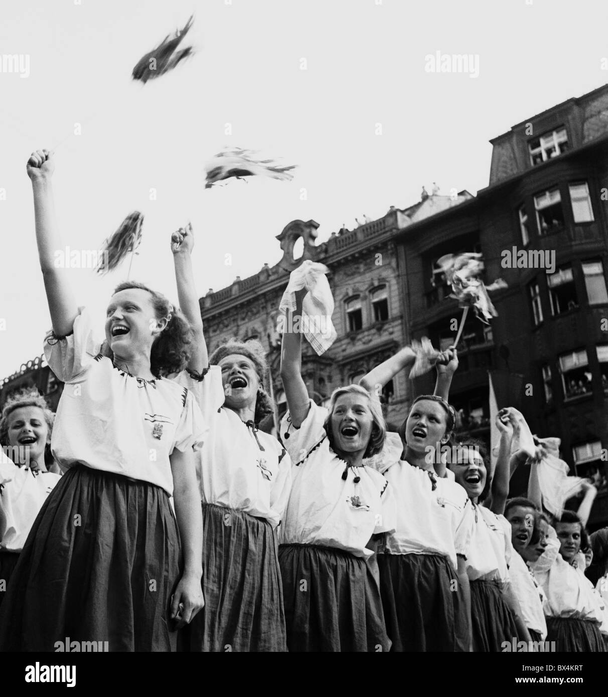 Czechoslovakia 1938, women tossing their hats celebrate arrival to ...
