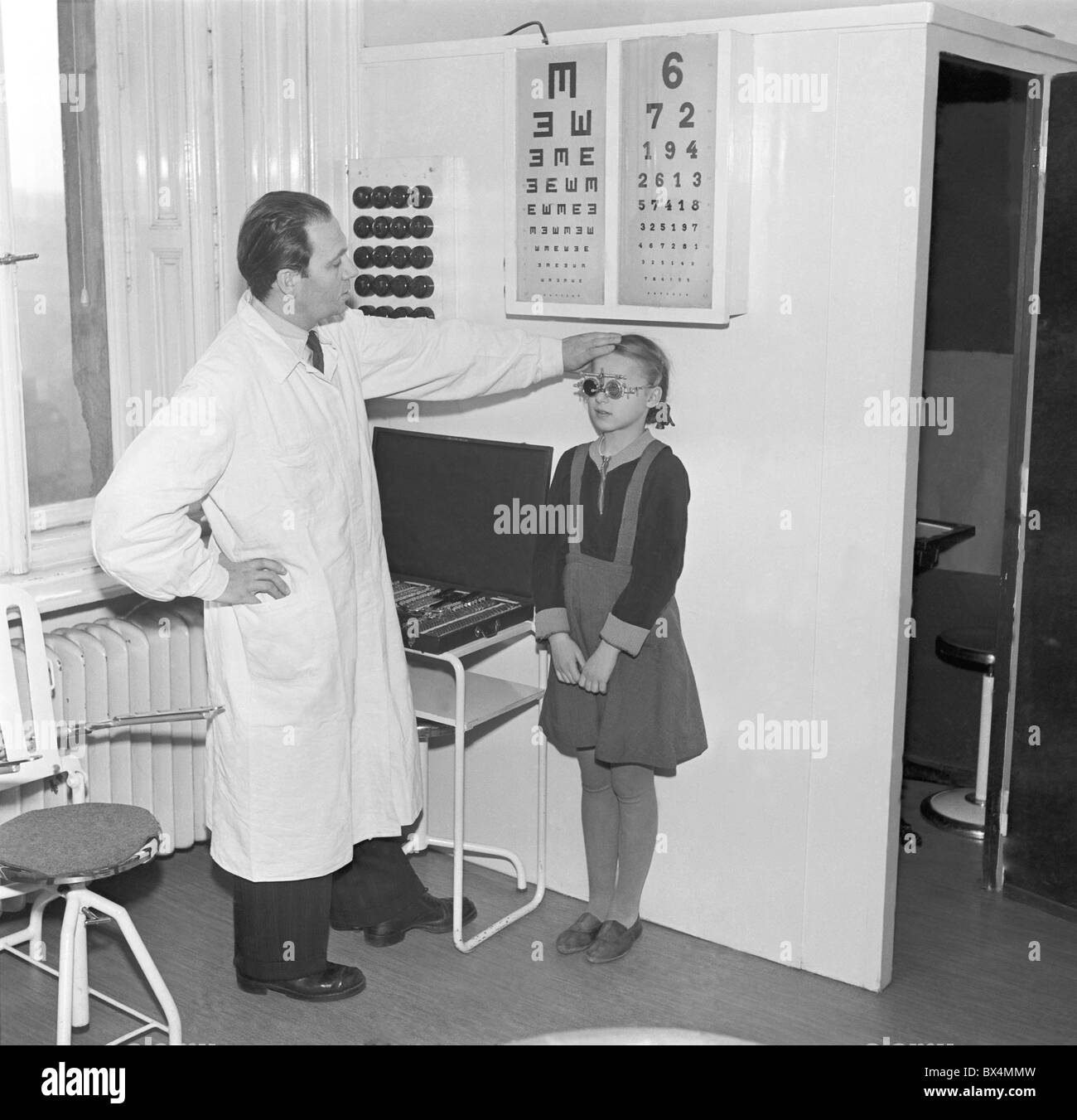Czechoslovakia - Prague 1950. Doctor examines girlsÂ´s eye sight. CTK ...