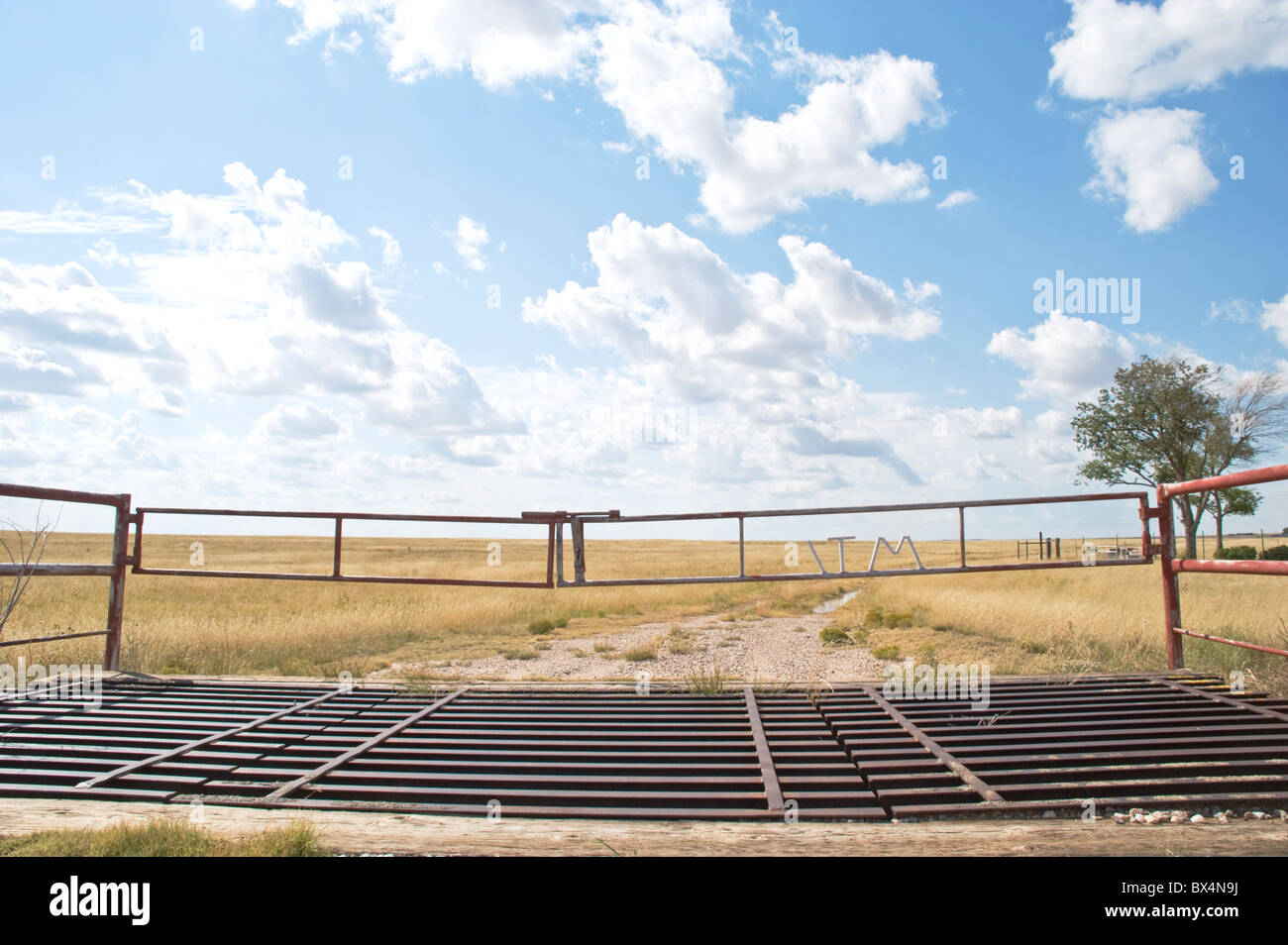 A ranch gate and cattle guard in a remote area of New Mexico Stock ...