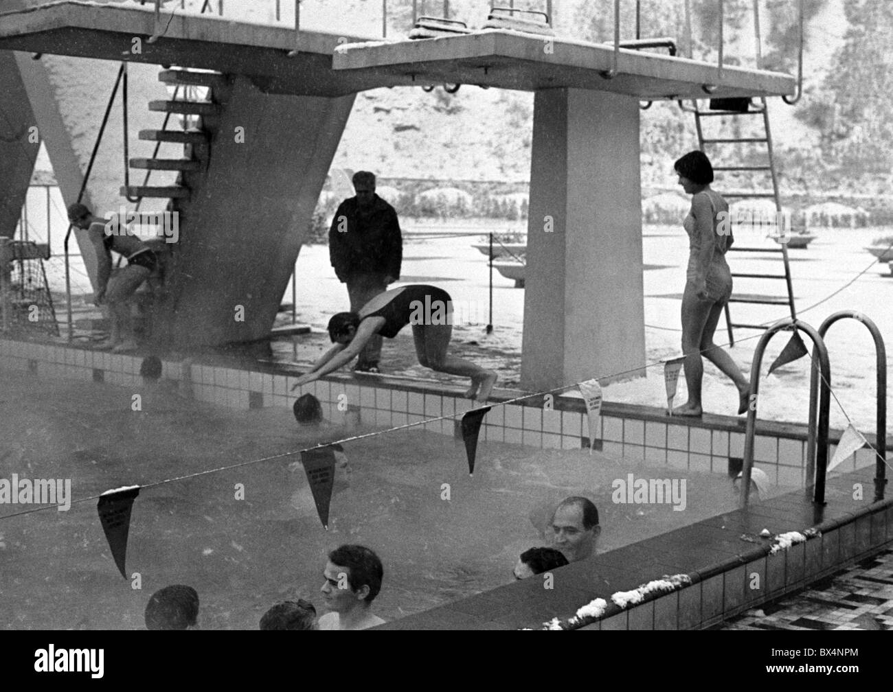 Prague, Czechoslovakia, 1968, young men braving cold temeratures swim ...