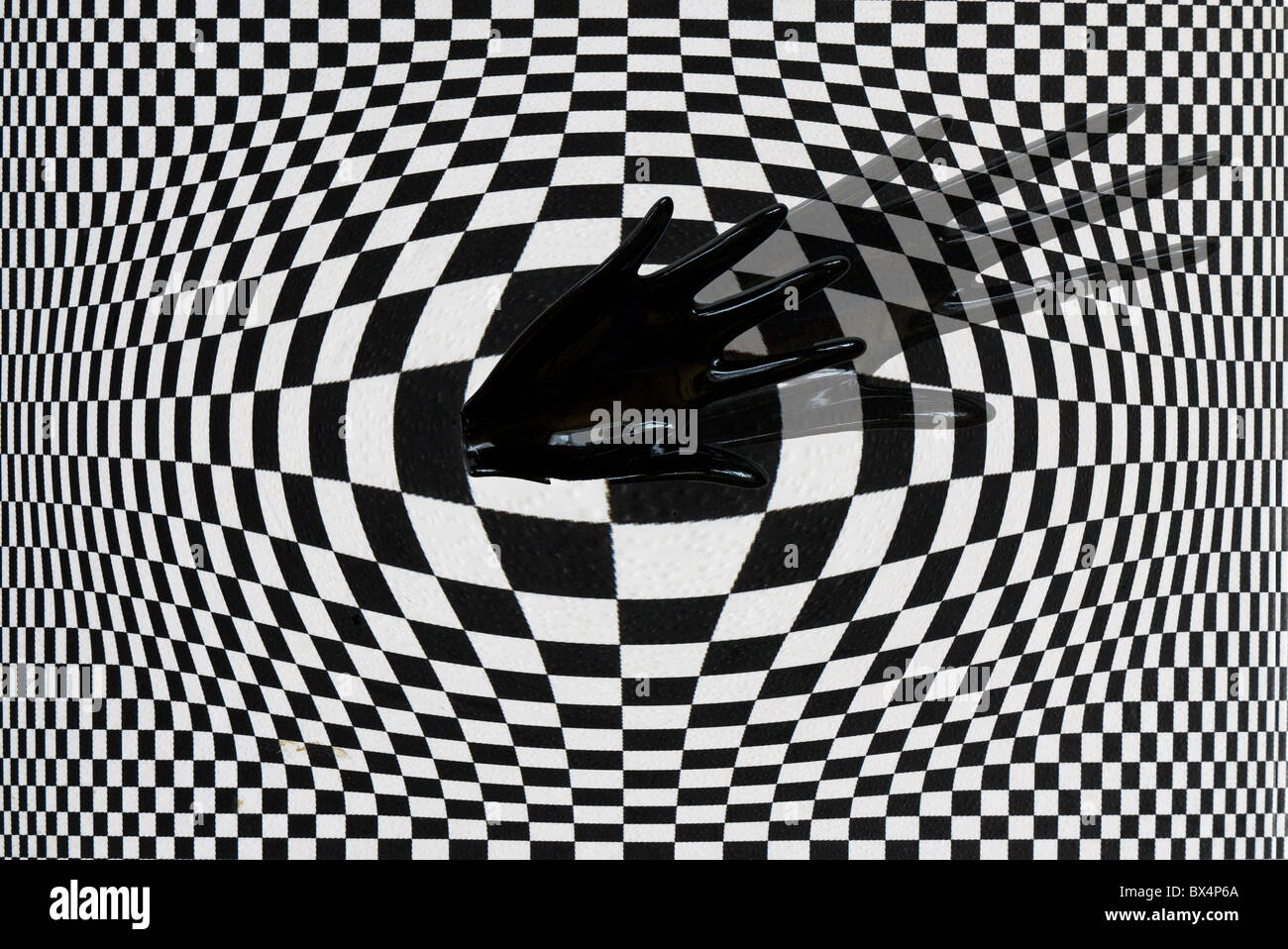 Black hand mind game Stock Photo - Alamy