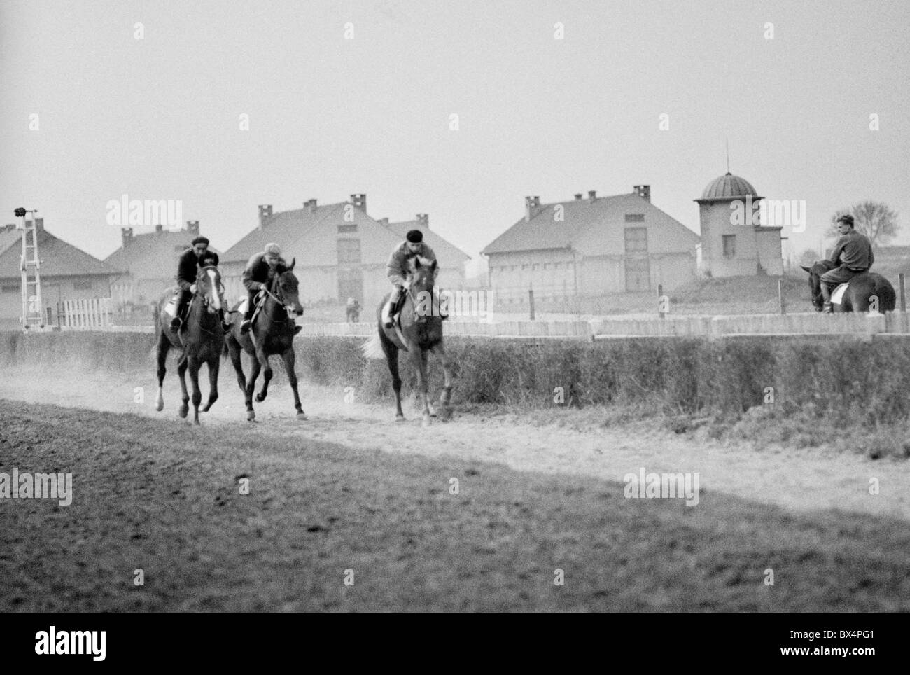 Race horses with riders exercice at Velka Chuchle racetrack ...
