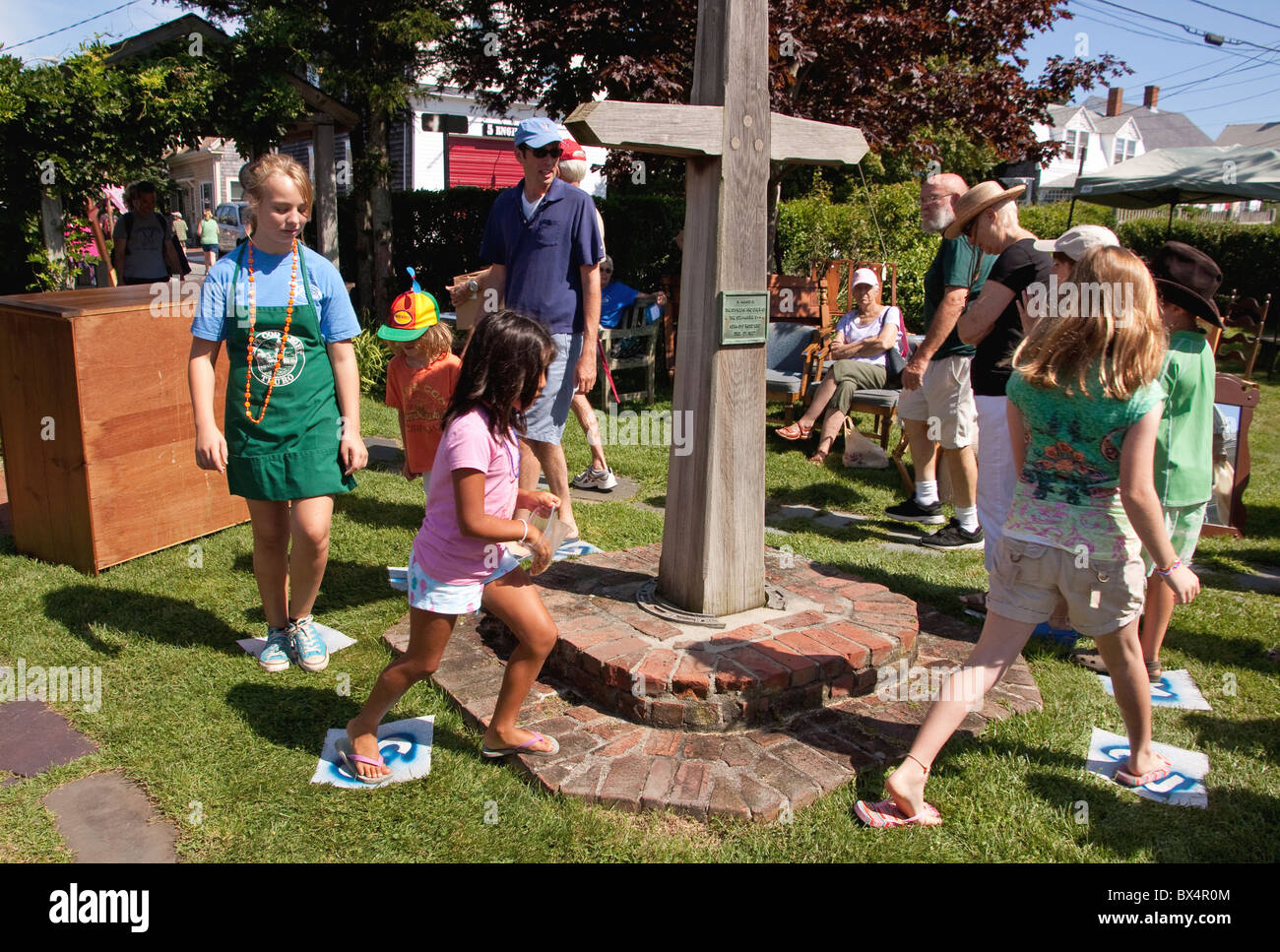 Cakewalk game at a local church fundraiser. The players circle the ...
