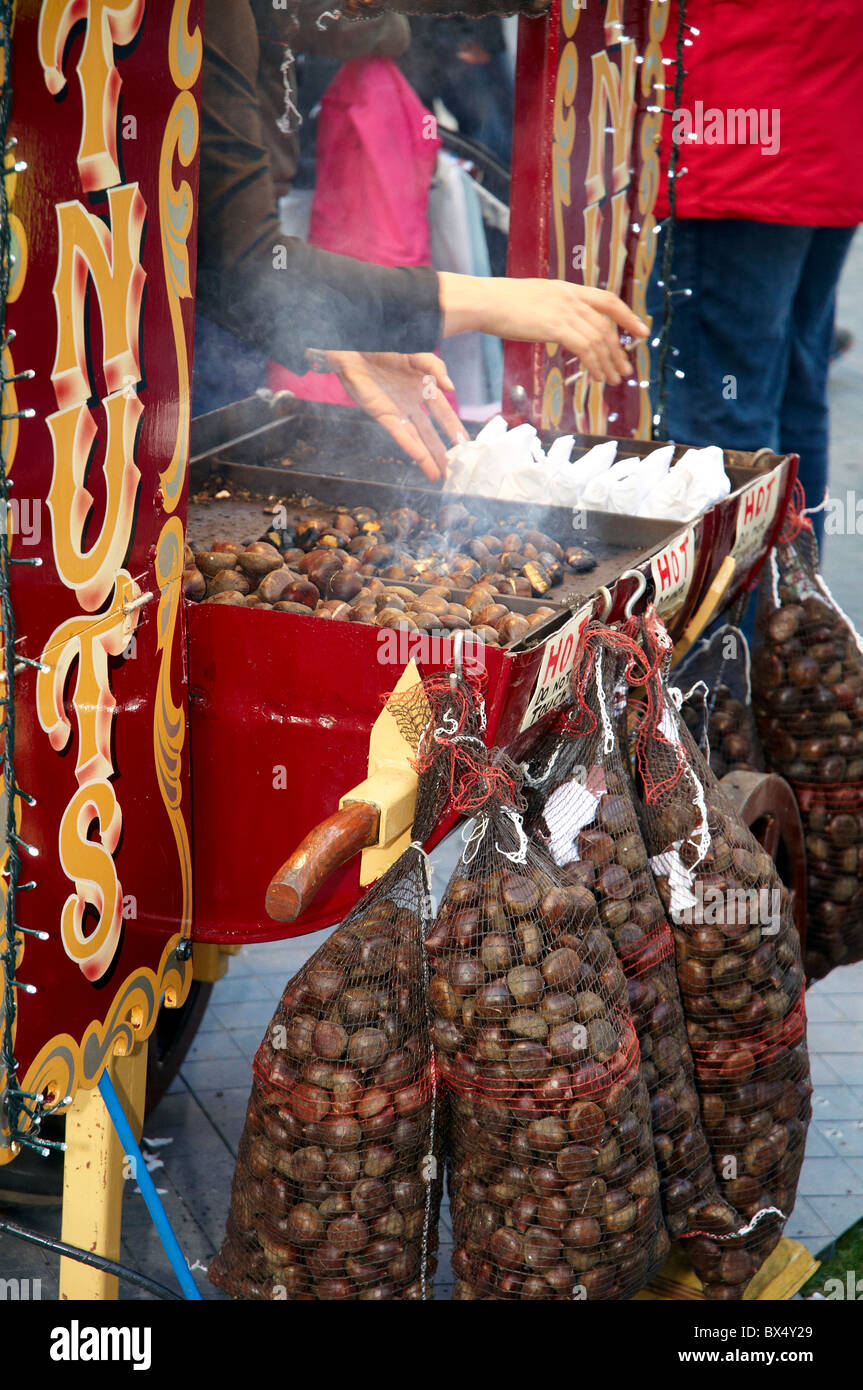 Hot chestnut stall in market hi-res stock photography and images - Alamy