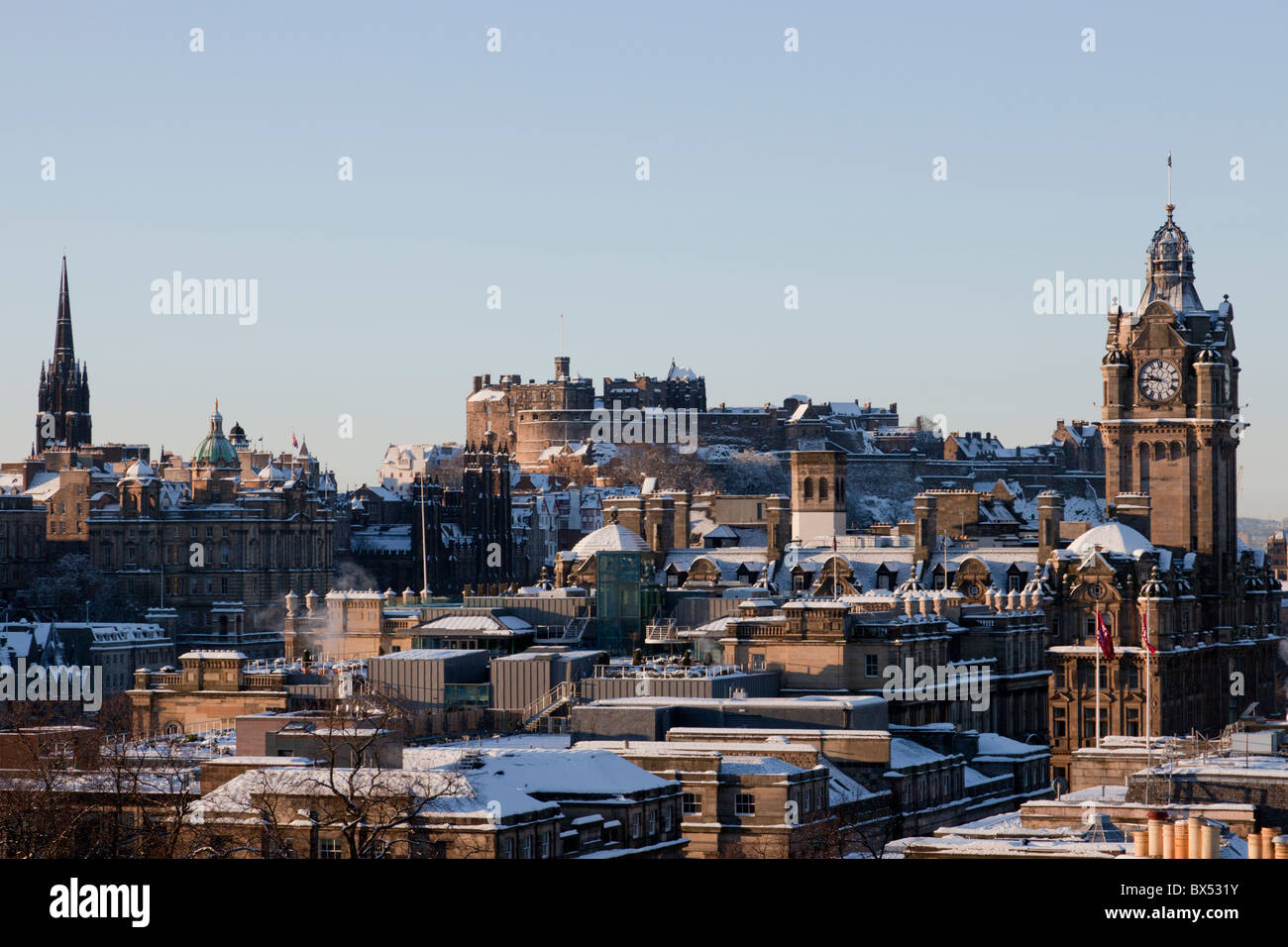 Edinburgh rooftop cityscape in snow on a cold winter morning with the ...