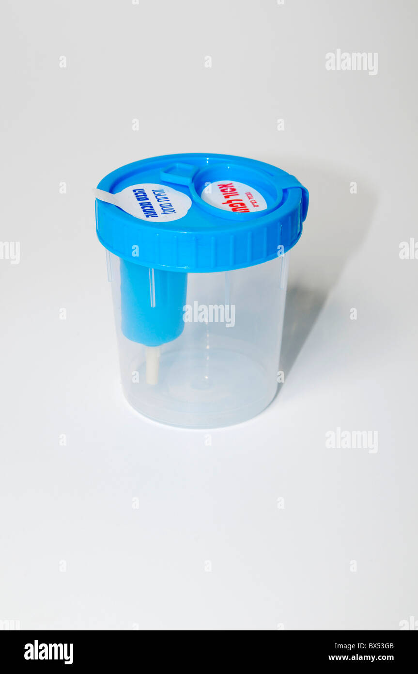 Urine sample cup Stock Photo - Alamy