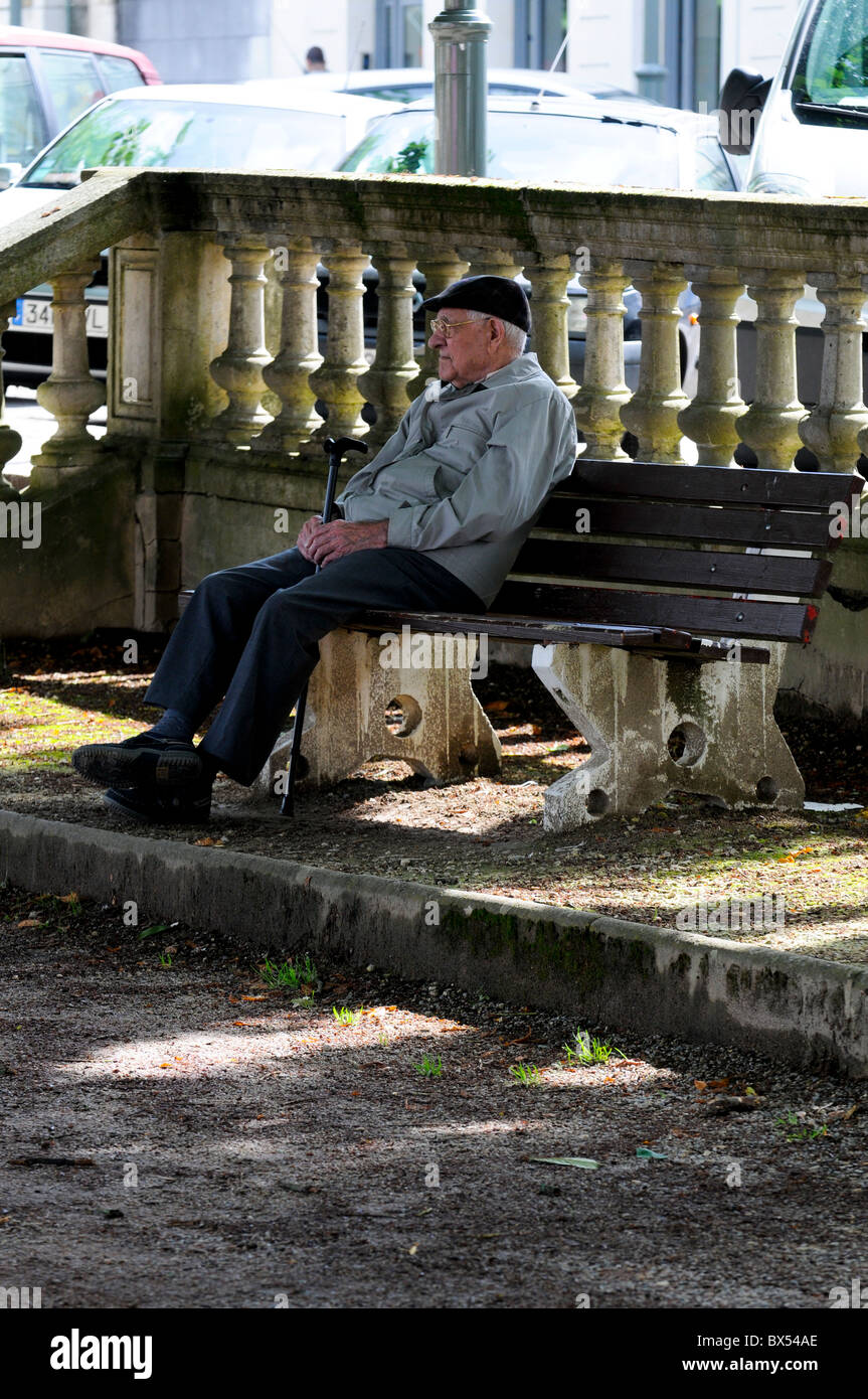 Senior Citizen sitting on a Bench Stock Photo - Alamy