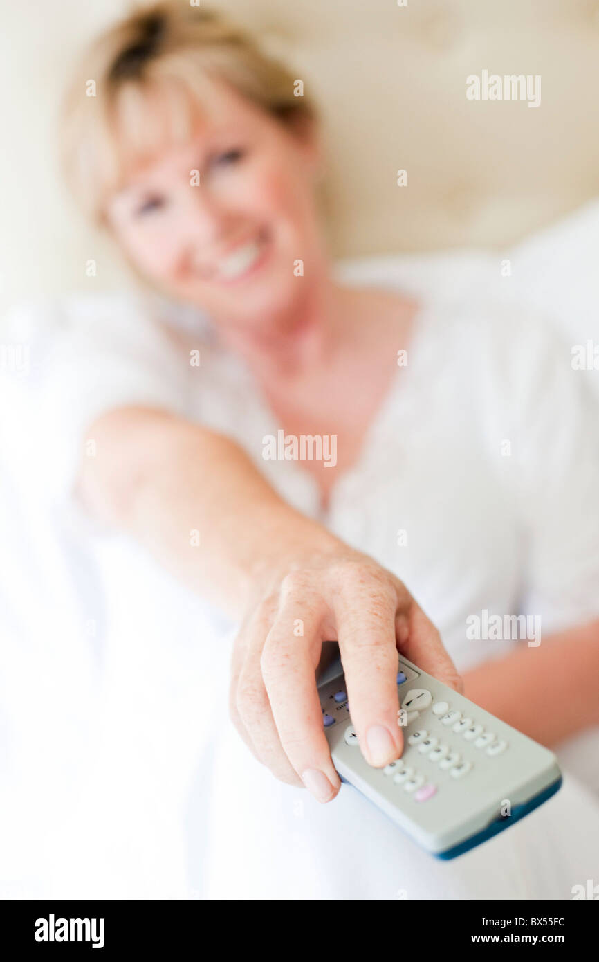 Remote control use Stock Photo - Alamy