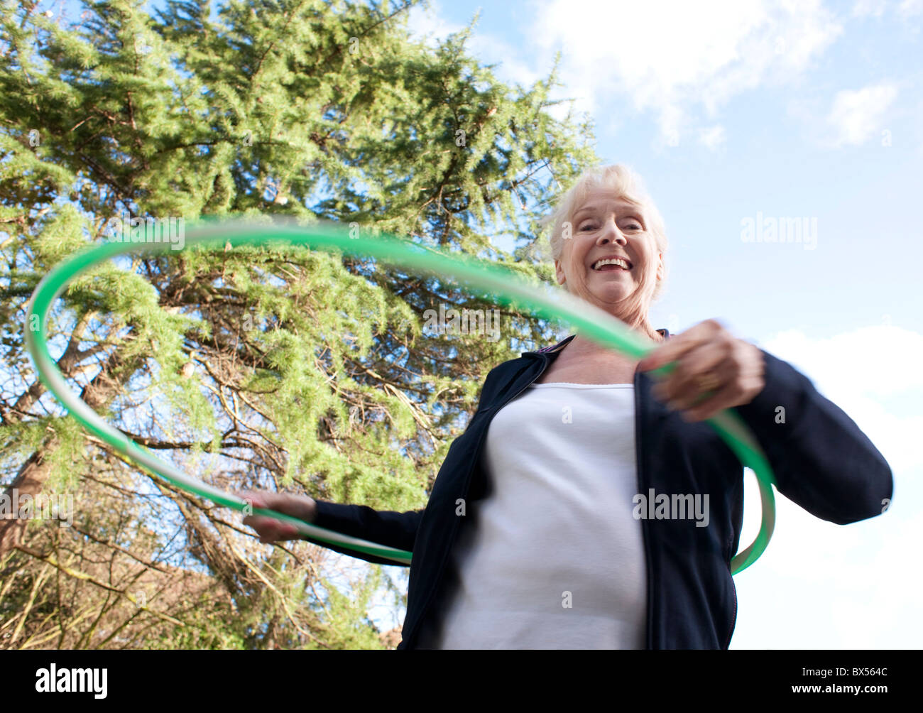 Woman exercising hula hoop hi-res stock photography and images - Alamy
