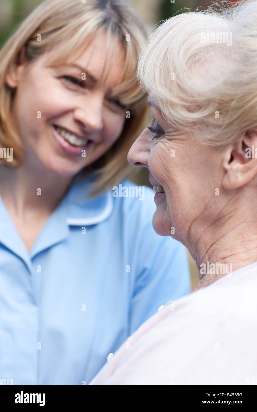 Nurse on a home visit Stock Photo - Alamy