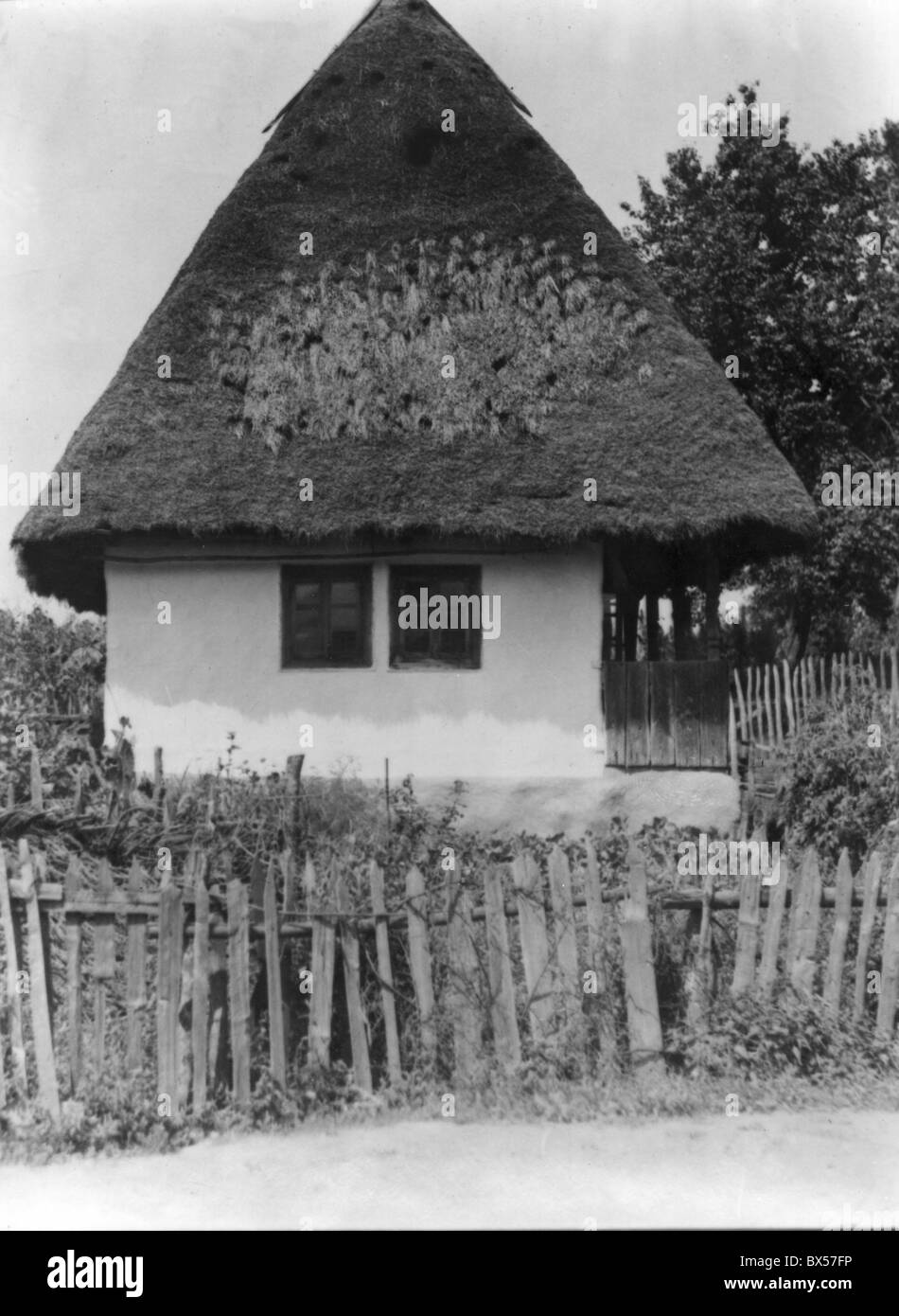 Straw roof house Black and White Stock Photos & Images - Alamy