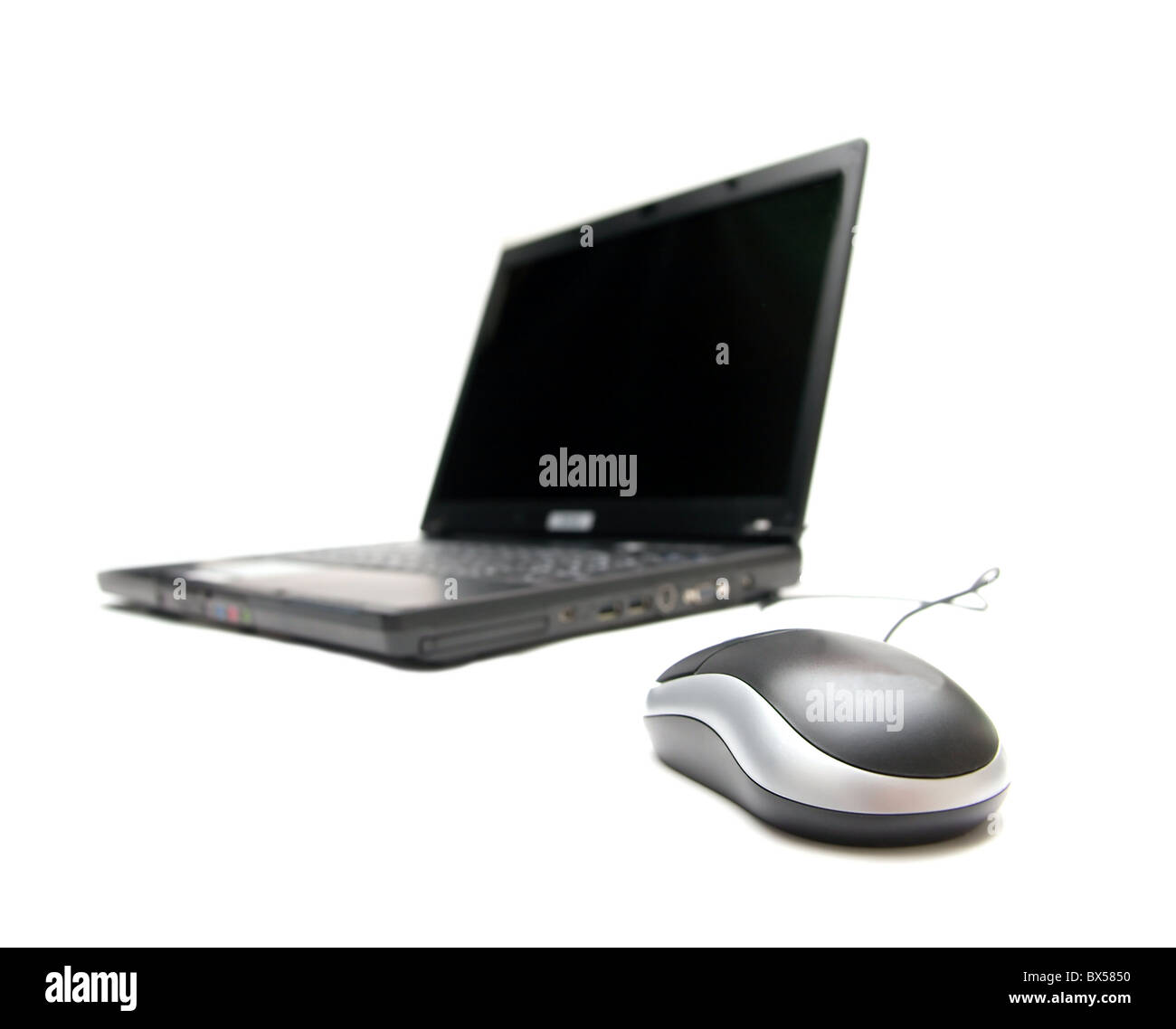 Mouse and laptop isolated on white background Stock Photo - Alamy