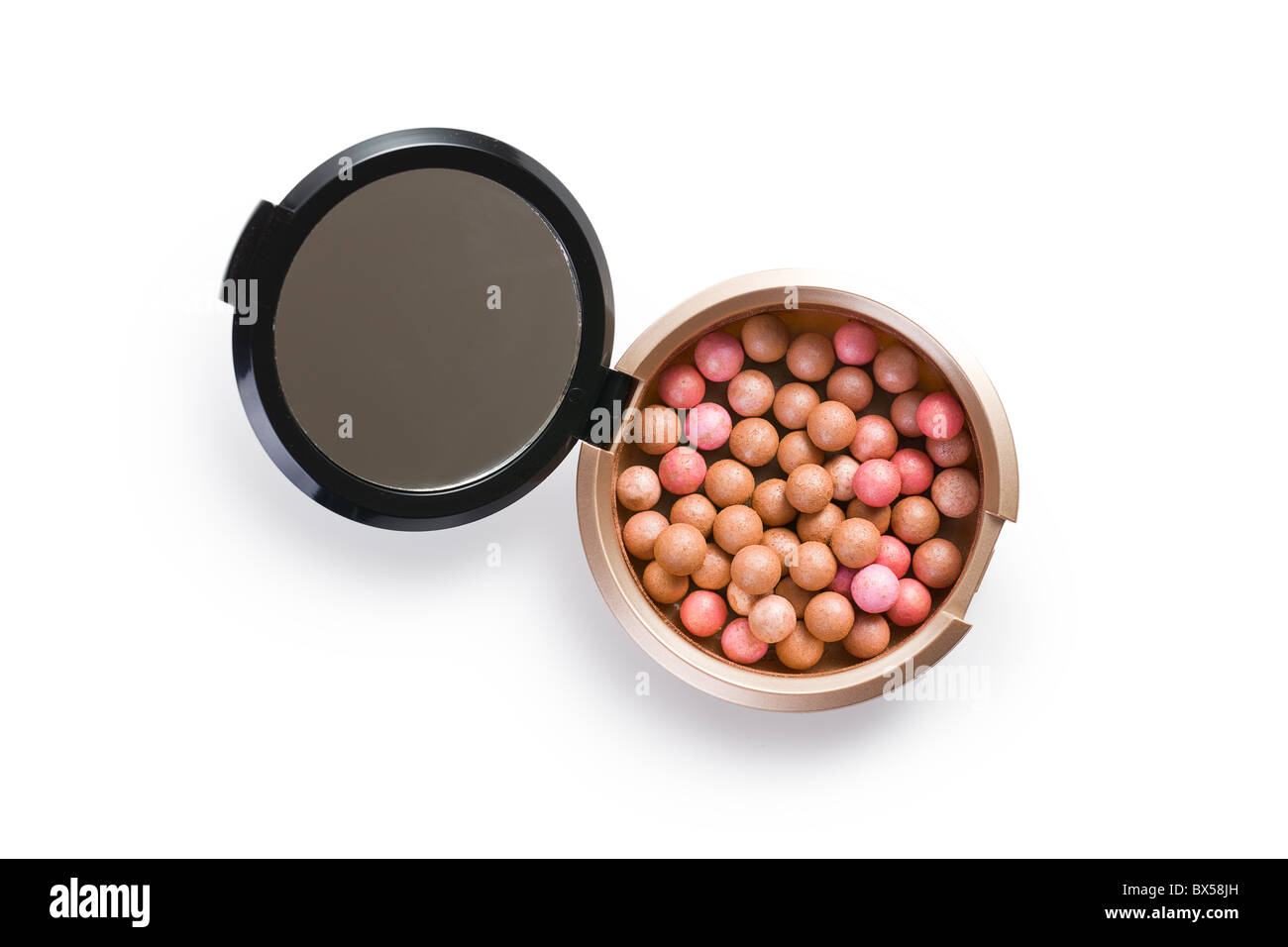 bronzing pearls powder on white background Stock Photo - Alamy