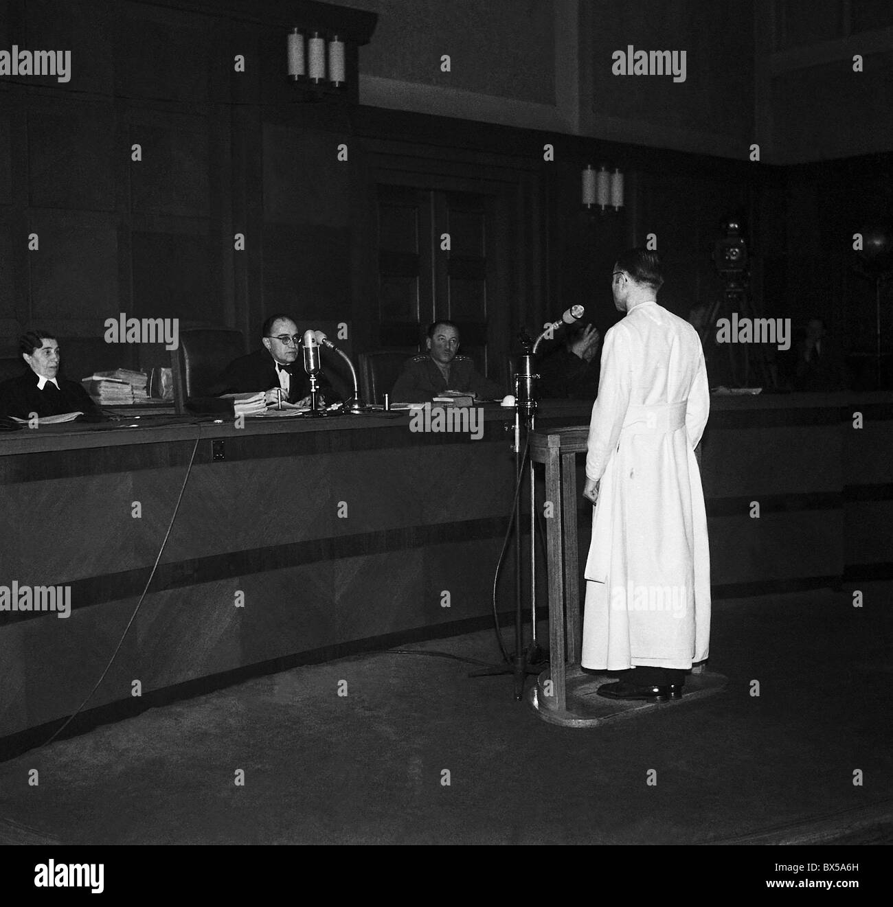 Clergy on trial Stock Photo - Alamy