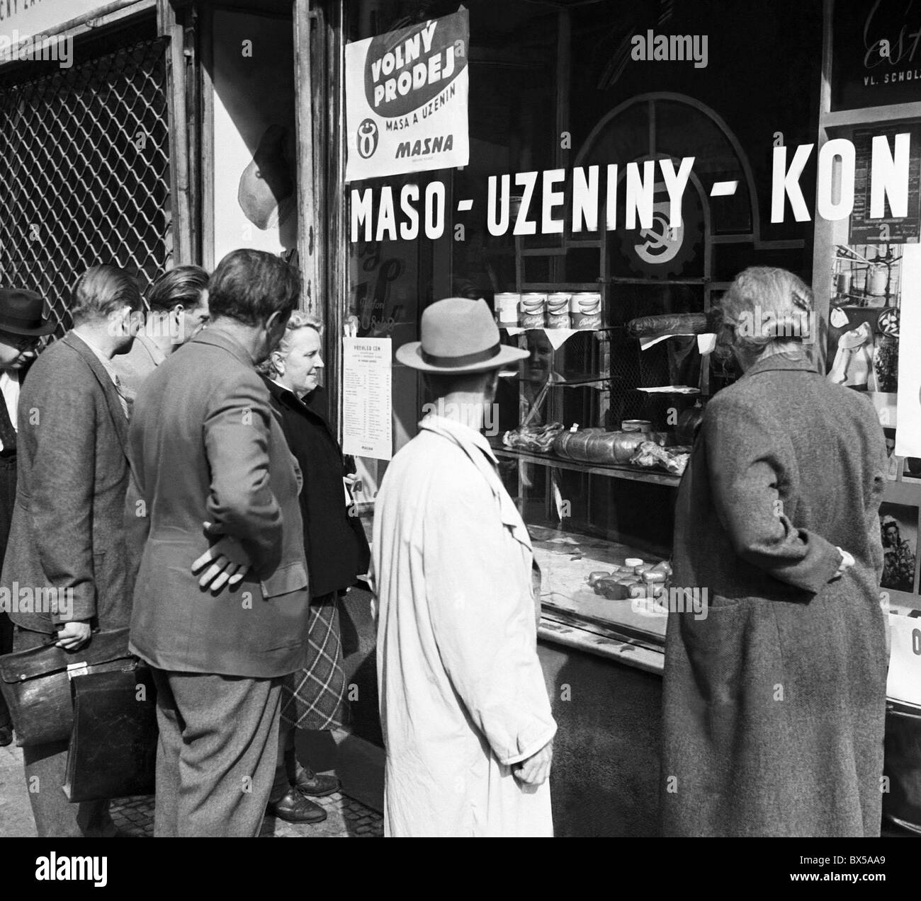 Czechoslovakia - Prague 1949. People view the meat selection offered by ...