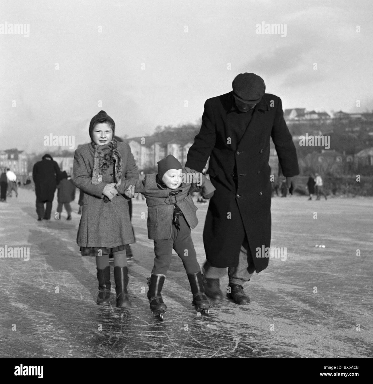 Have fun on the ice Black and White Stock Photos & Images - Alamy